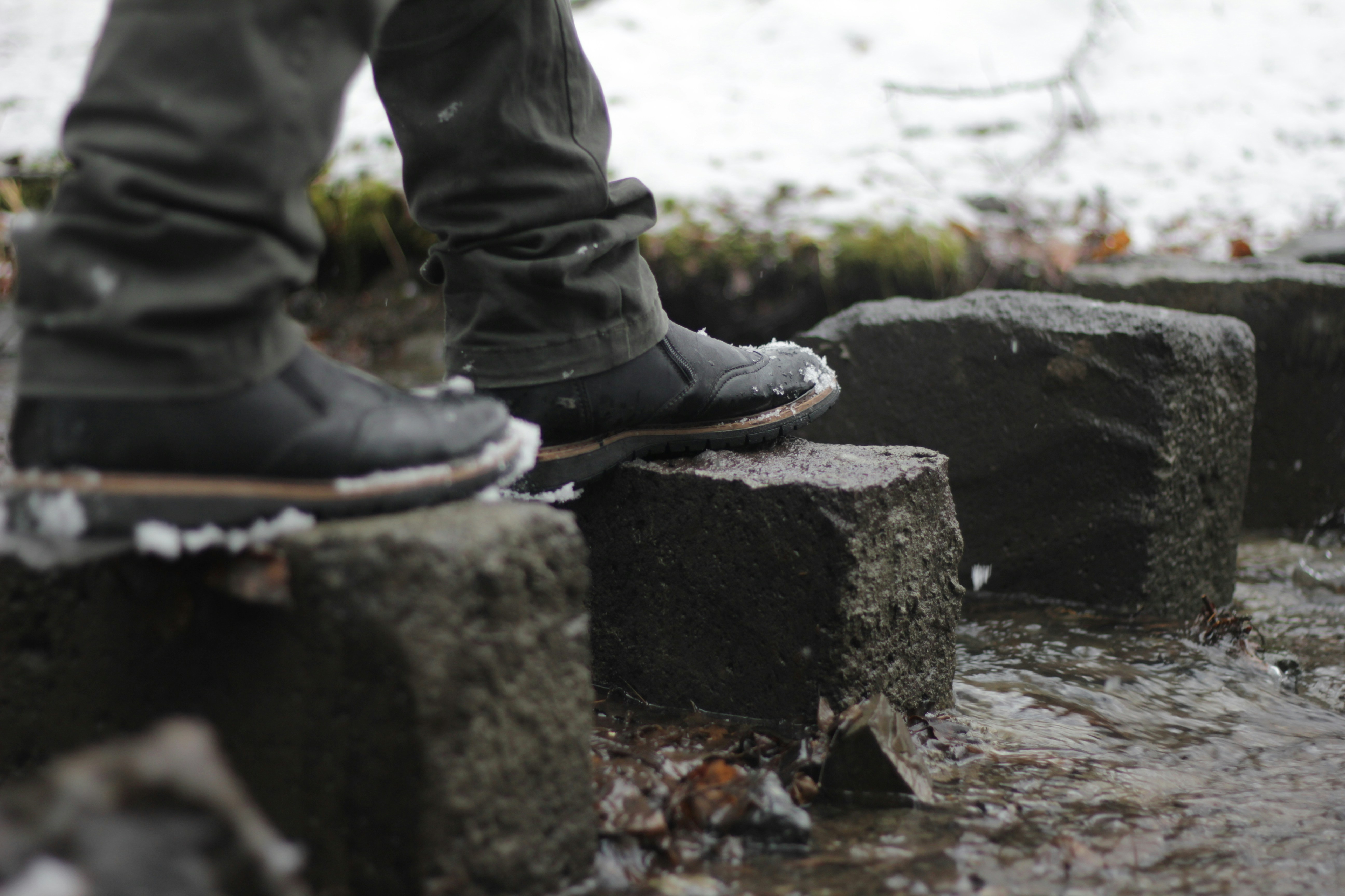 Stepped Across Cold Waters: Boots on Weathered Blocks