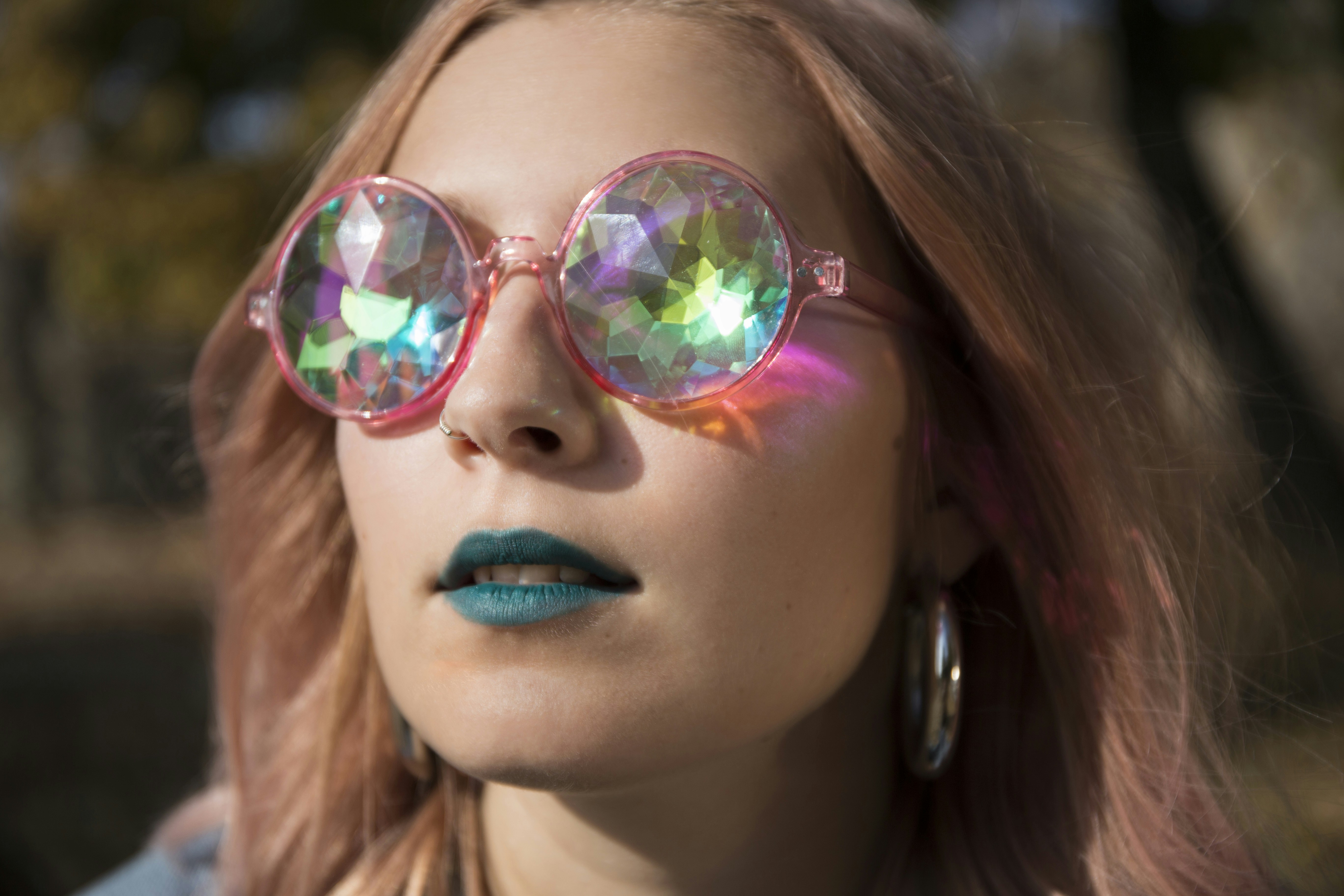 Iridescent Gaze: Portrait Through Prism-Glass Sunglasses