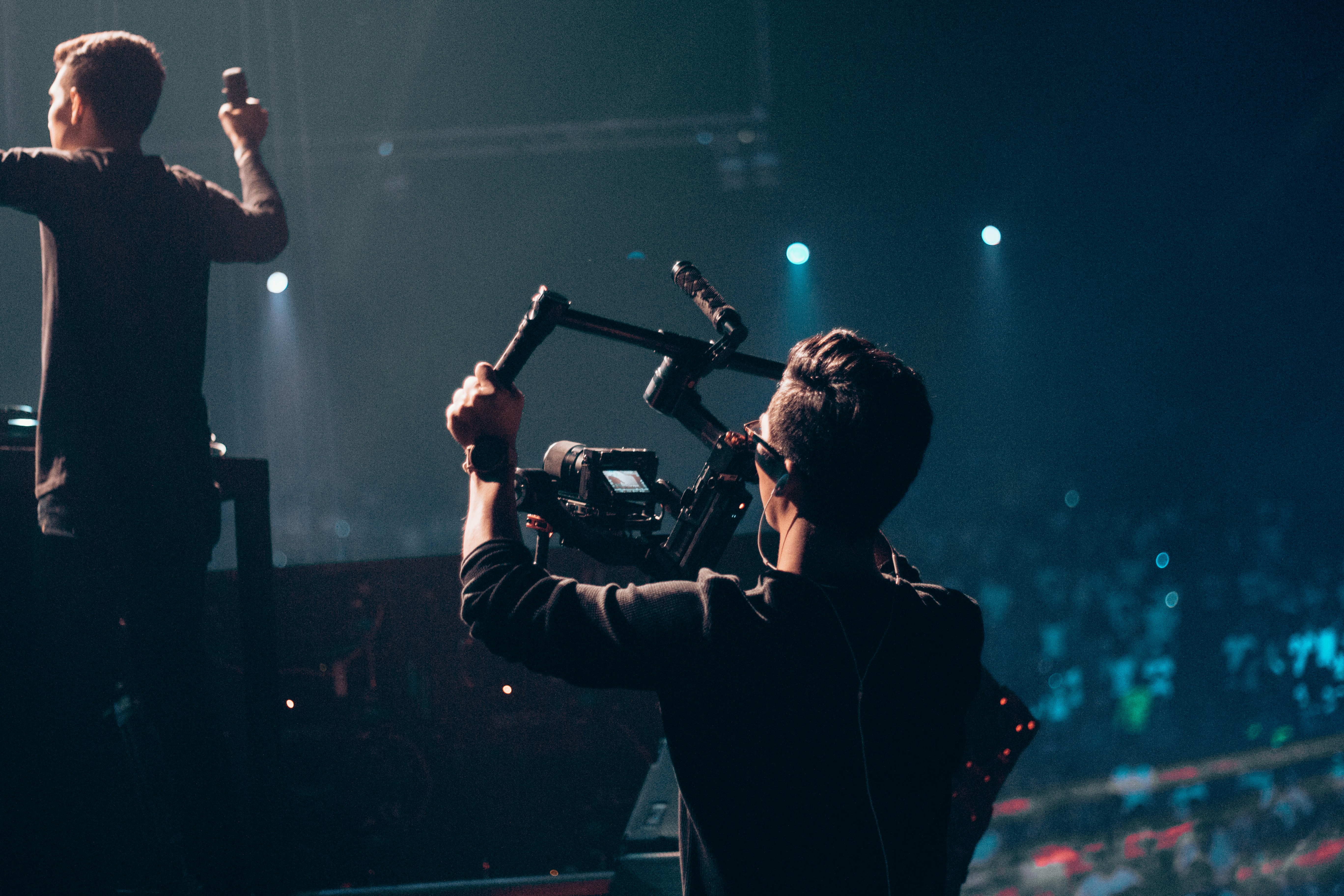 Man capturing man doing performance photo – Free Concert Image on Unsplash