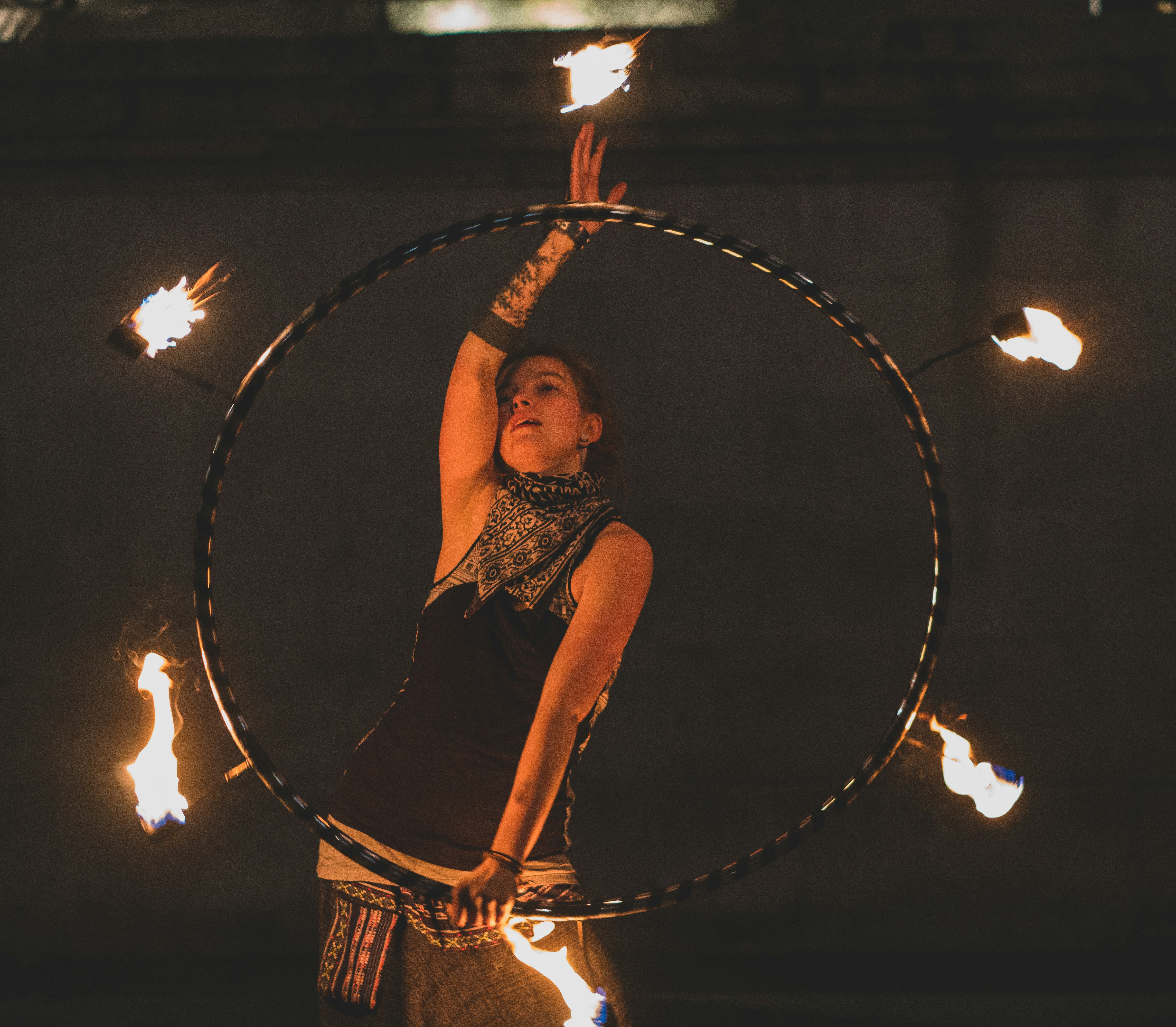 Woman fire dancing at night photo – Free London Image on Unsplash