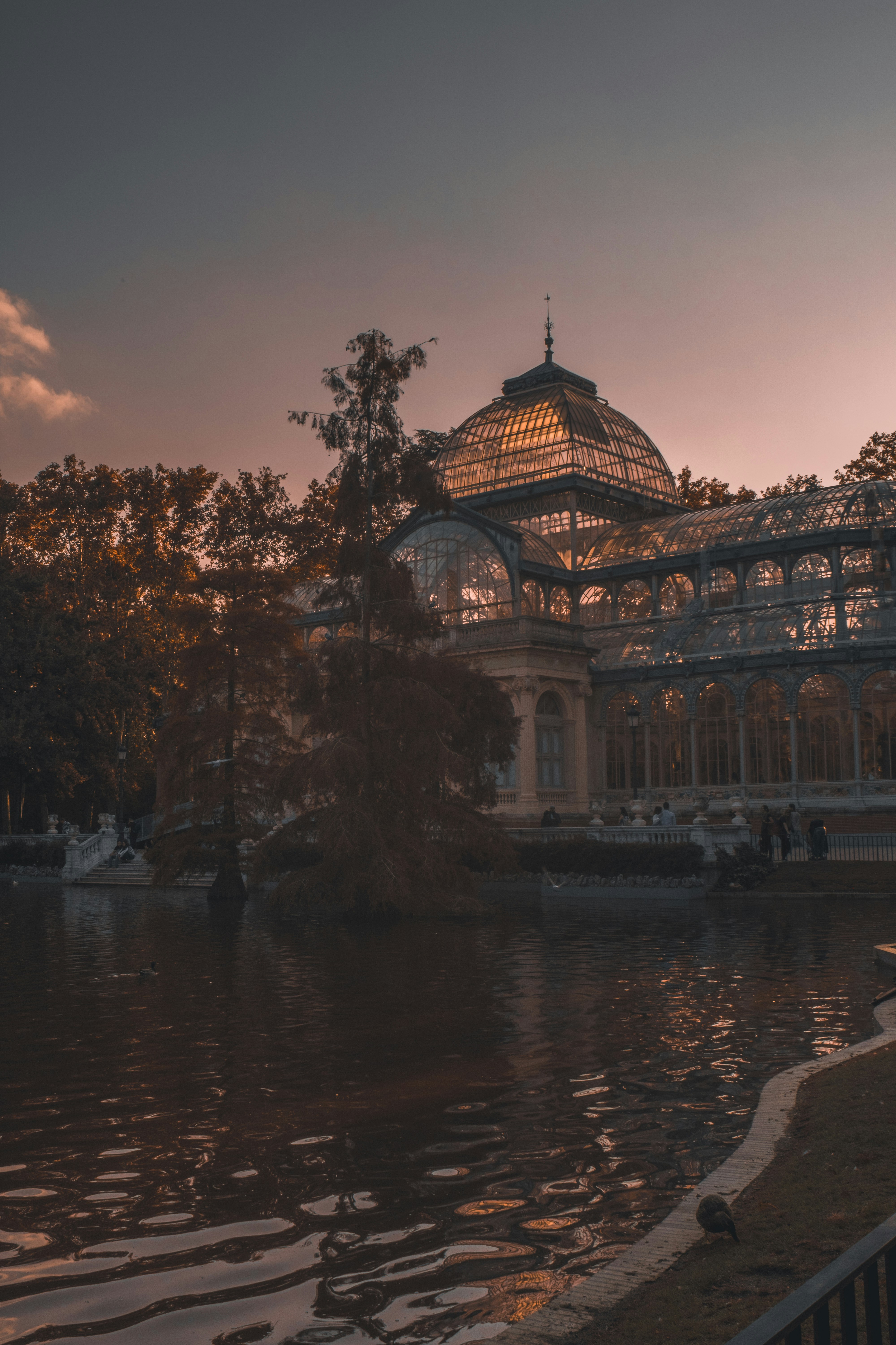 Ember-glow over Retiro's Glass Palace at Dusk