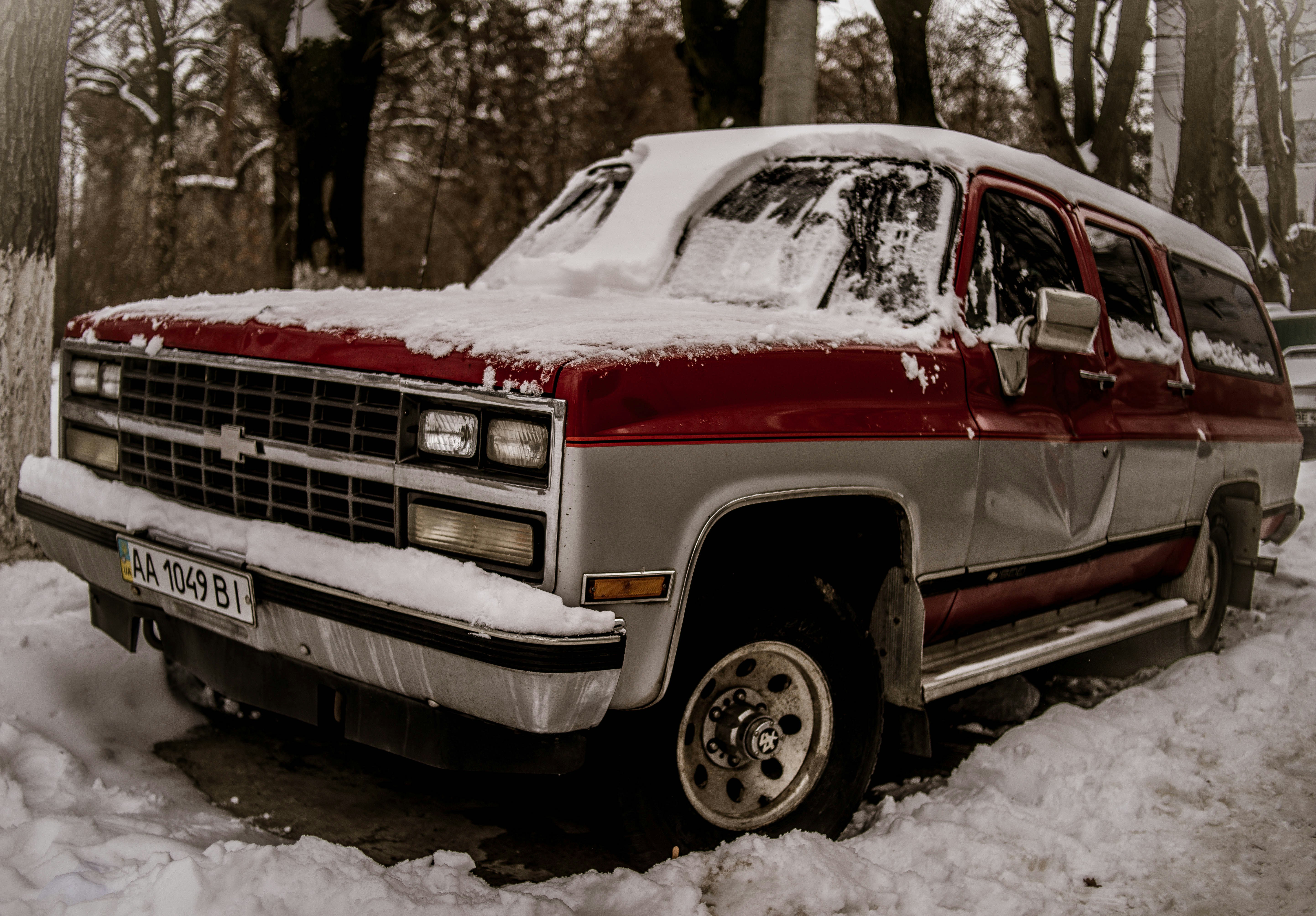 Vintage SUV Embraced by Winter's Touch