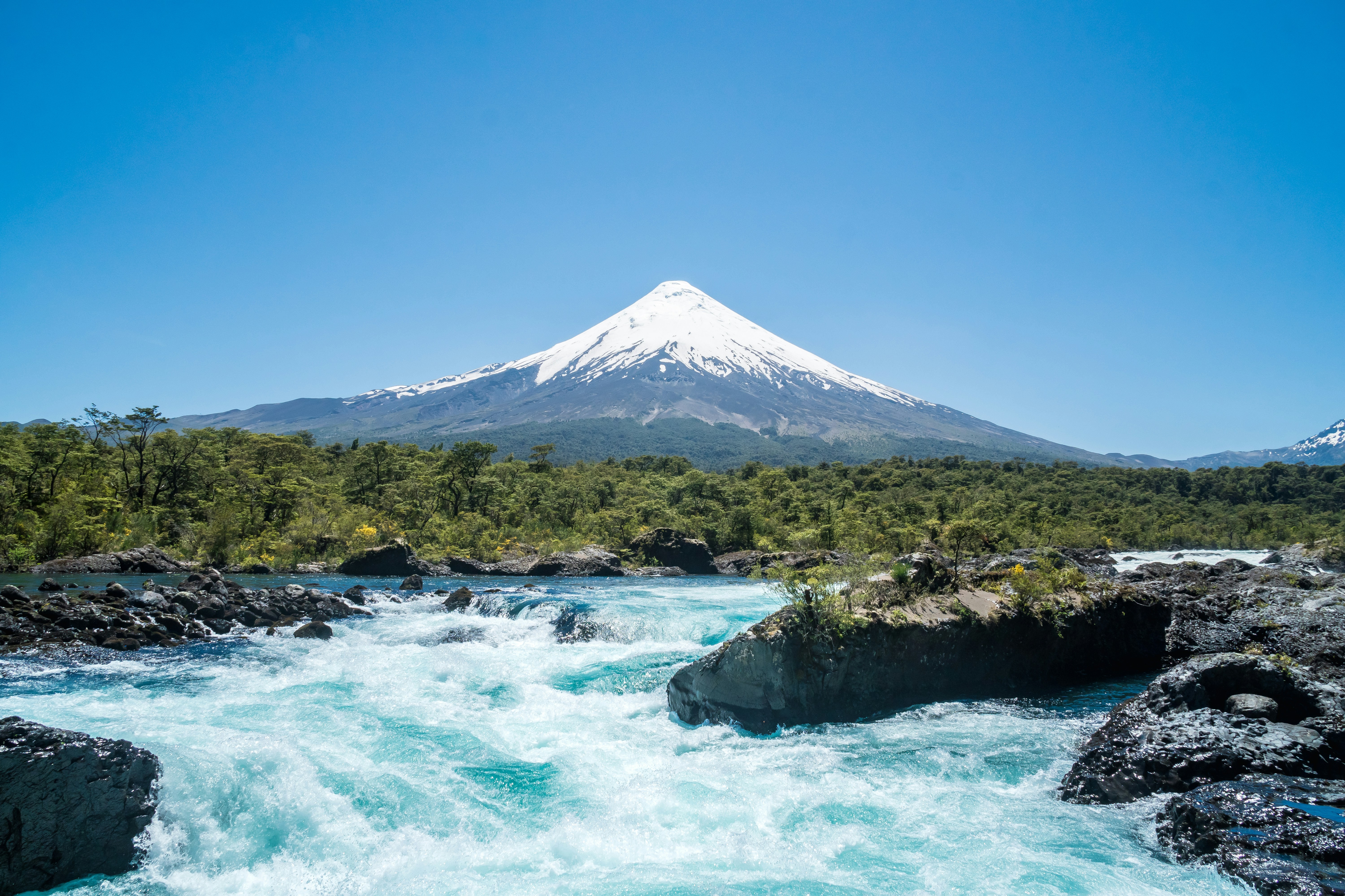 Icecrest Peak Over Turquoise Rapids
