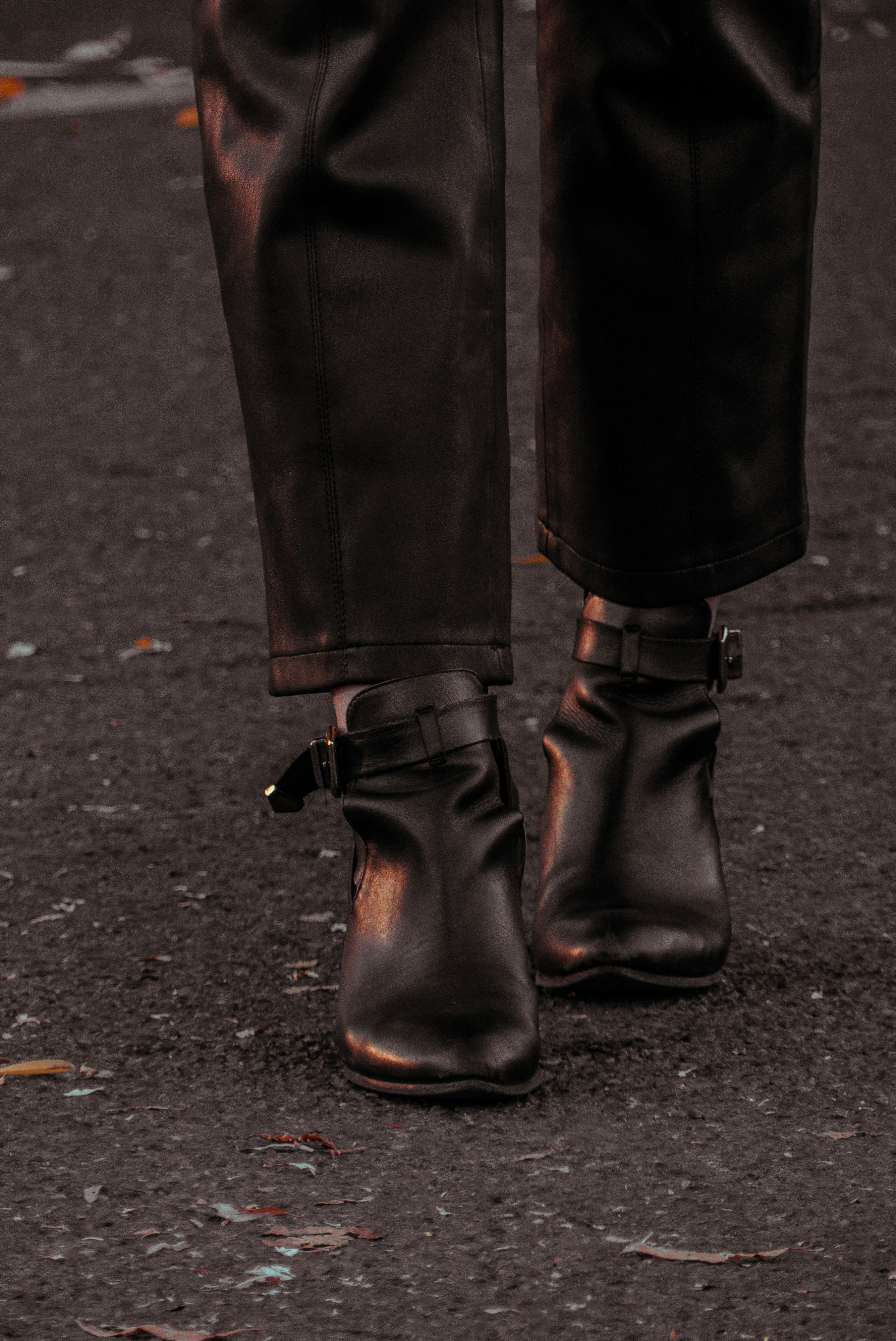 Dusk-Struck Boots: Buckled Leather on Quiet Asphalt