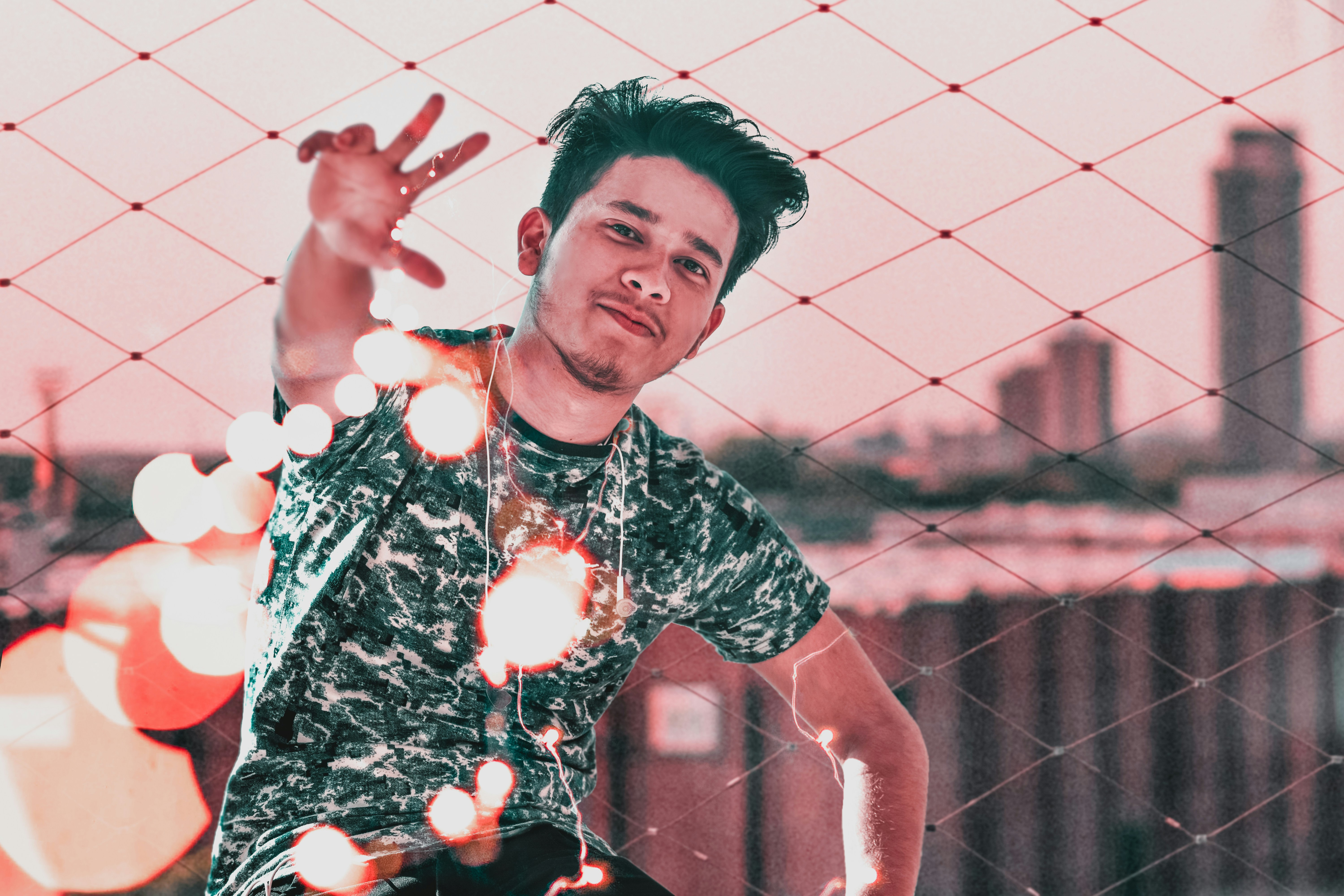 Neon Grid Portrait: Reaching Through the Wire Mesh