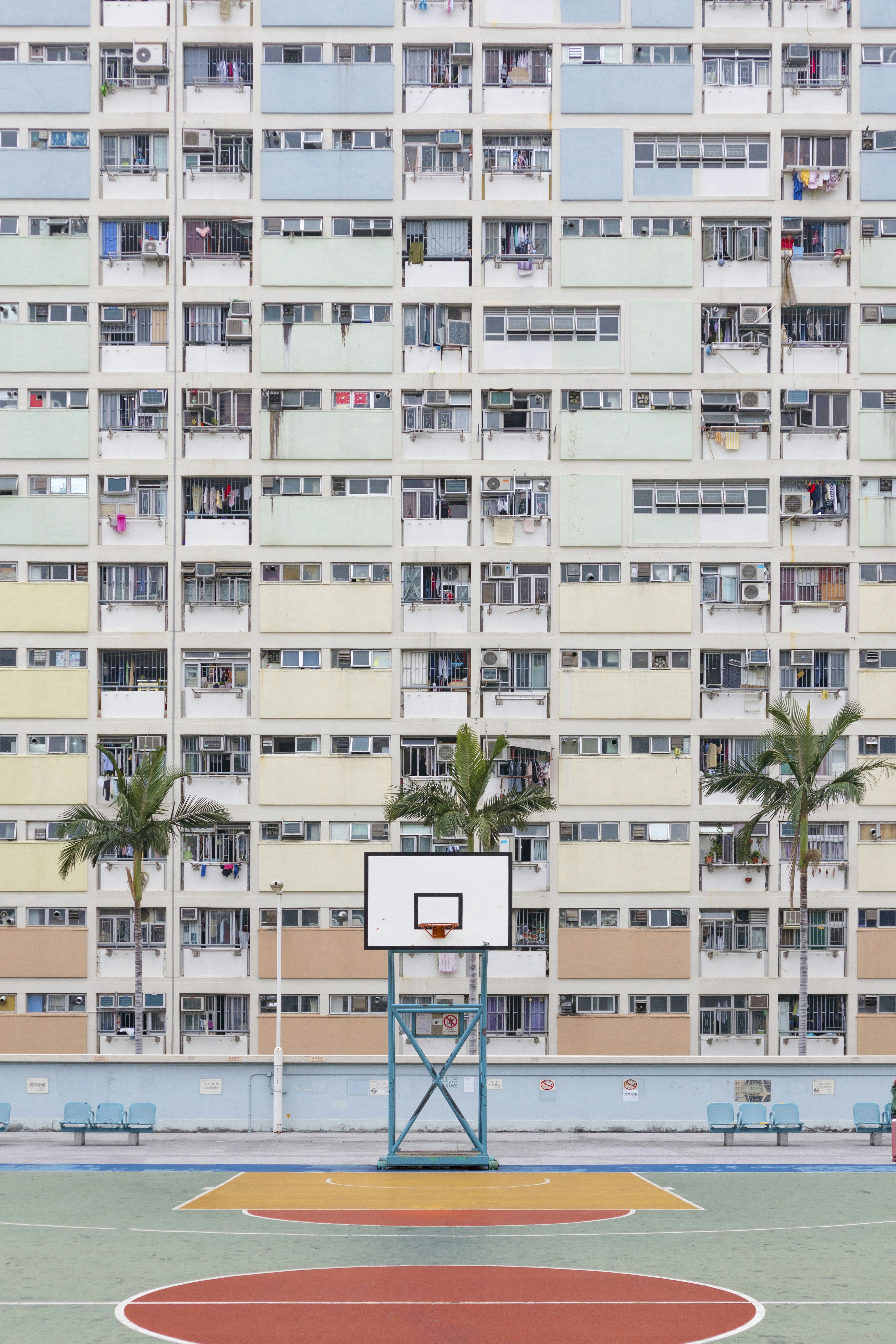 Pastel Towers, One Court: A City Playground in Focus