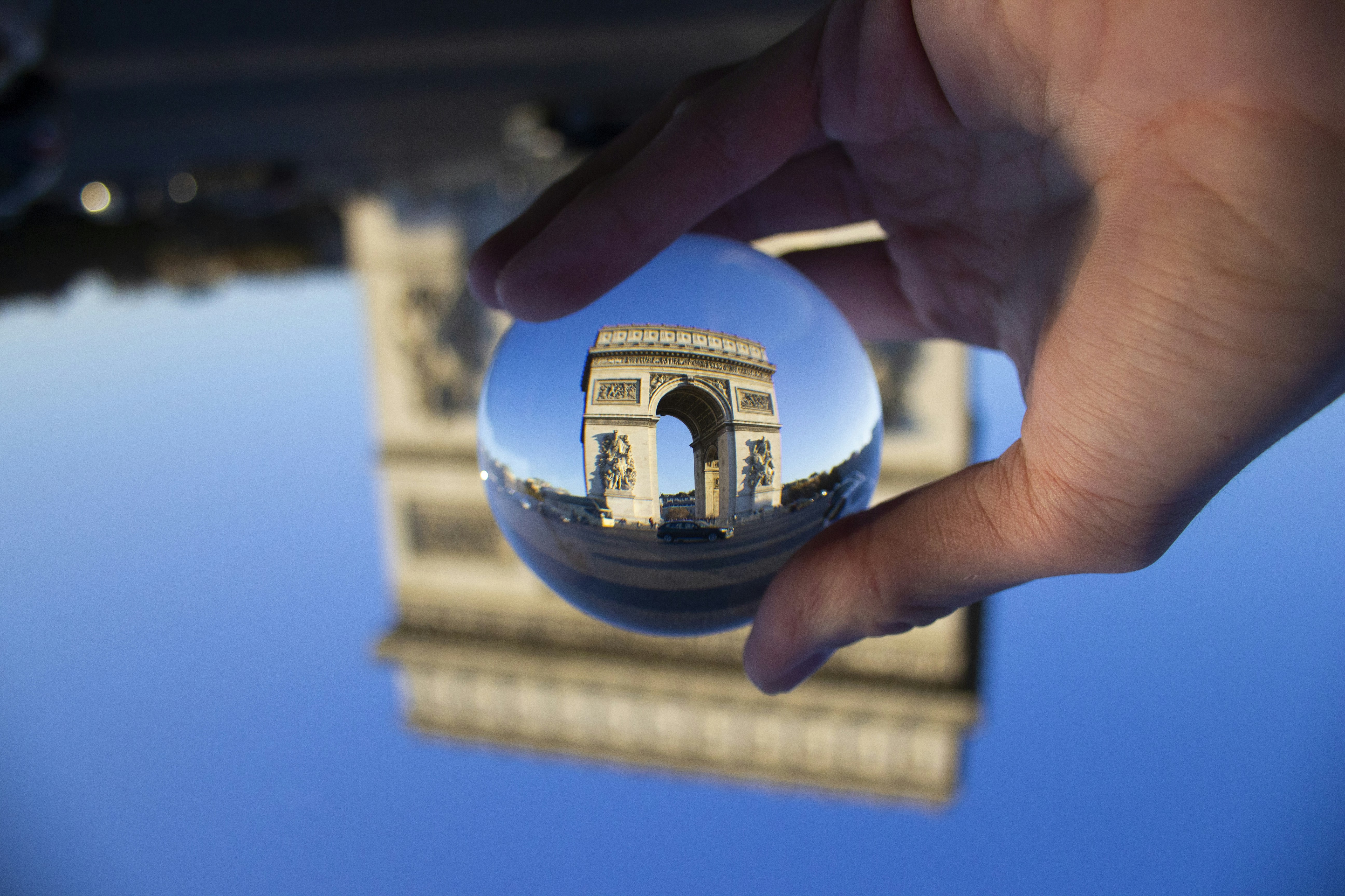 Refraction in a Glass Sphere: Arc de Triomphe Framed by Blue Sky