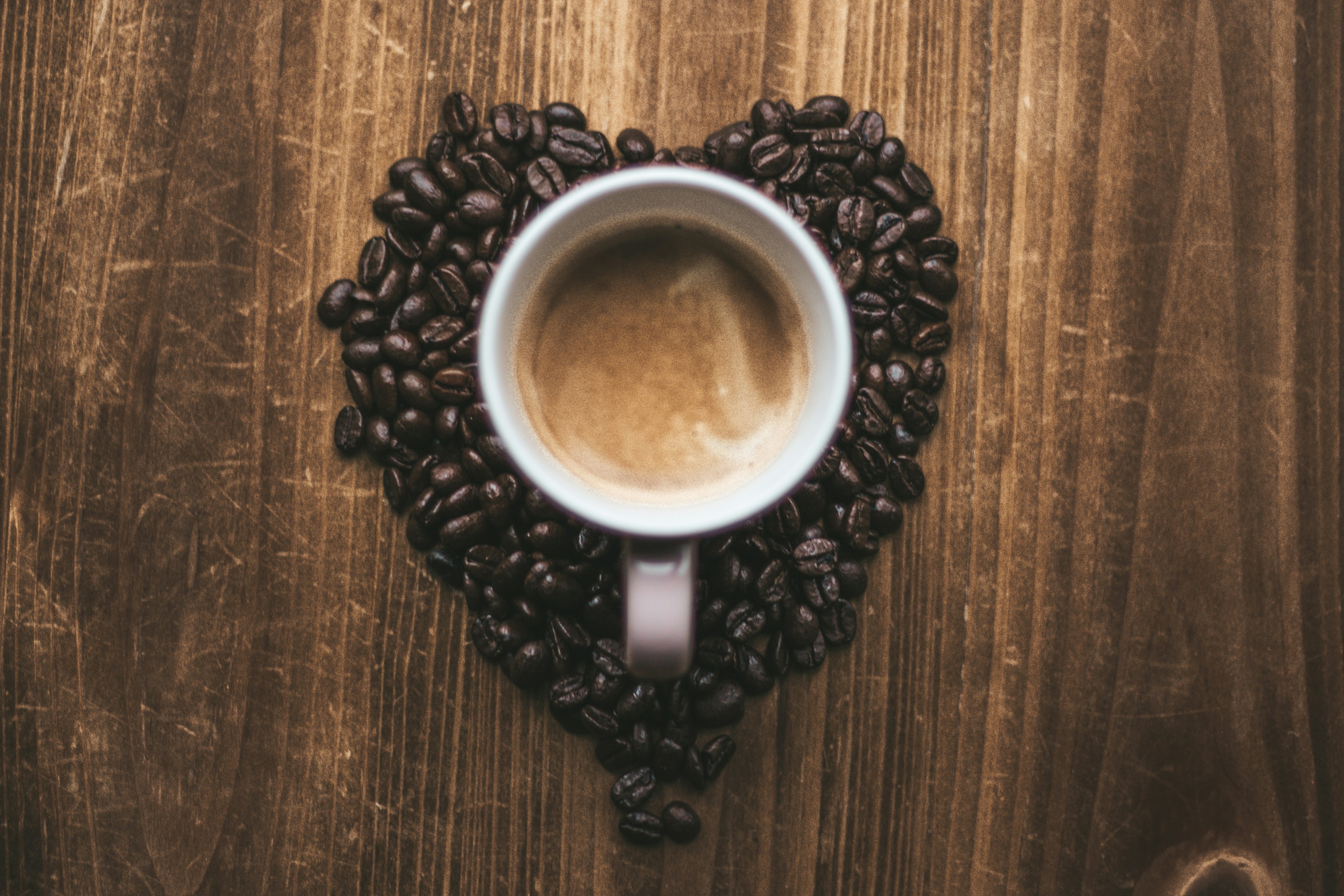 Centered Espresso Heart: A Top-Down Coffee Portrait