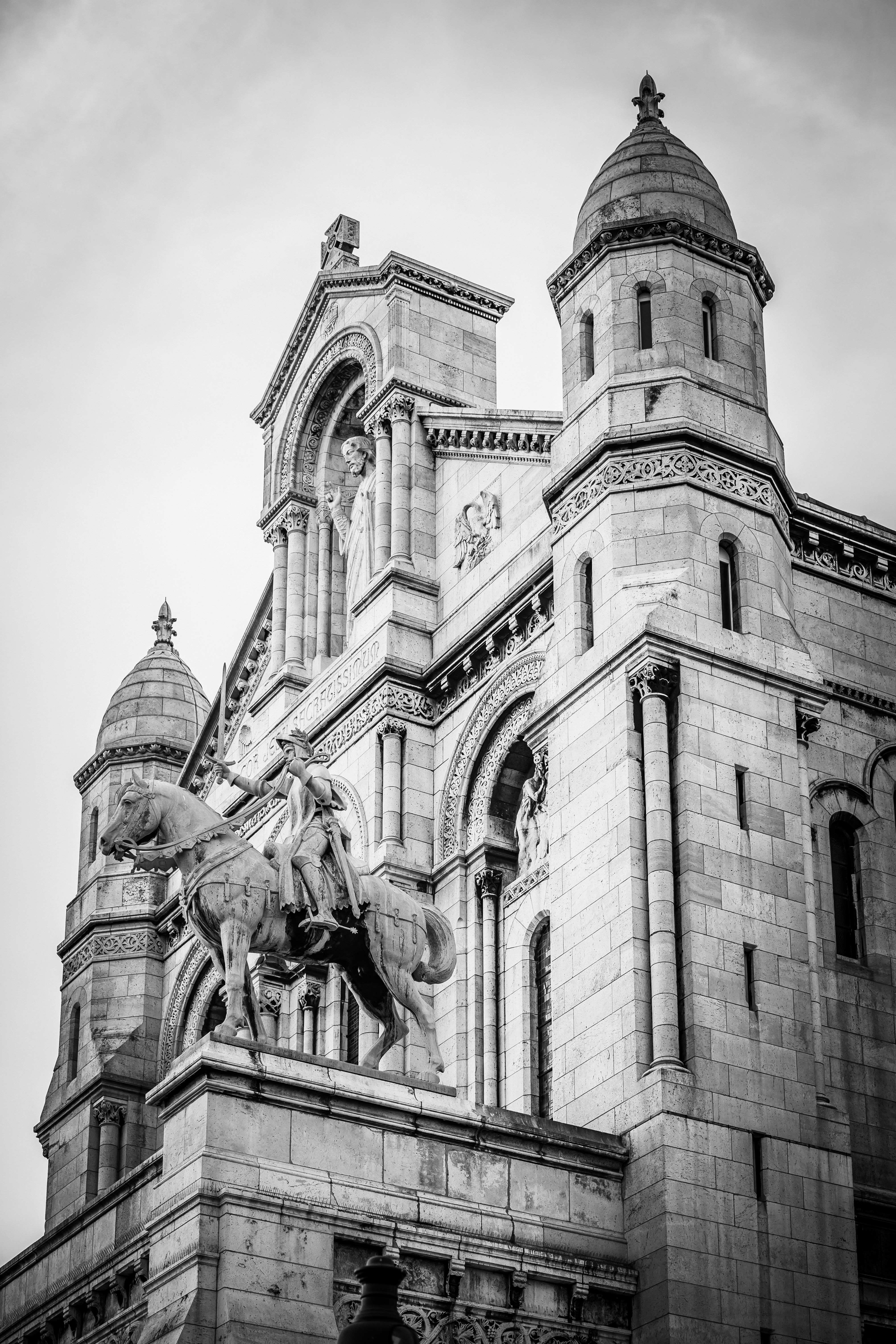 Equestrian Sentinel Above a Neo-Gothic Facade