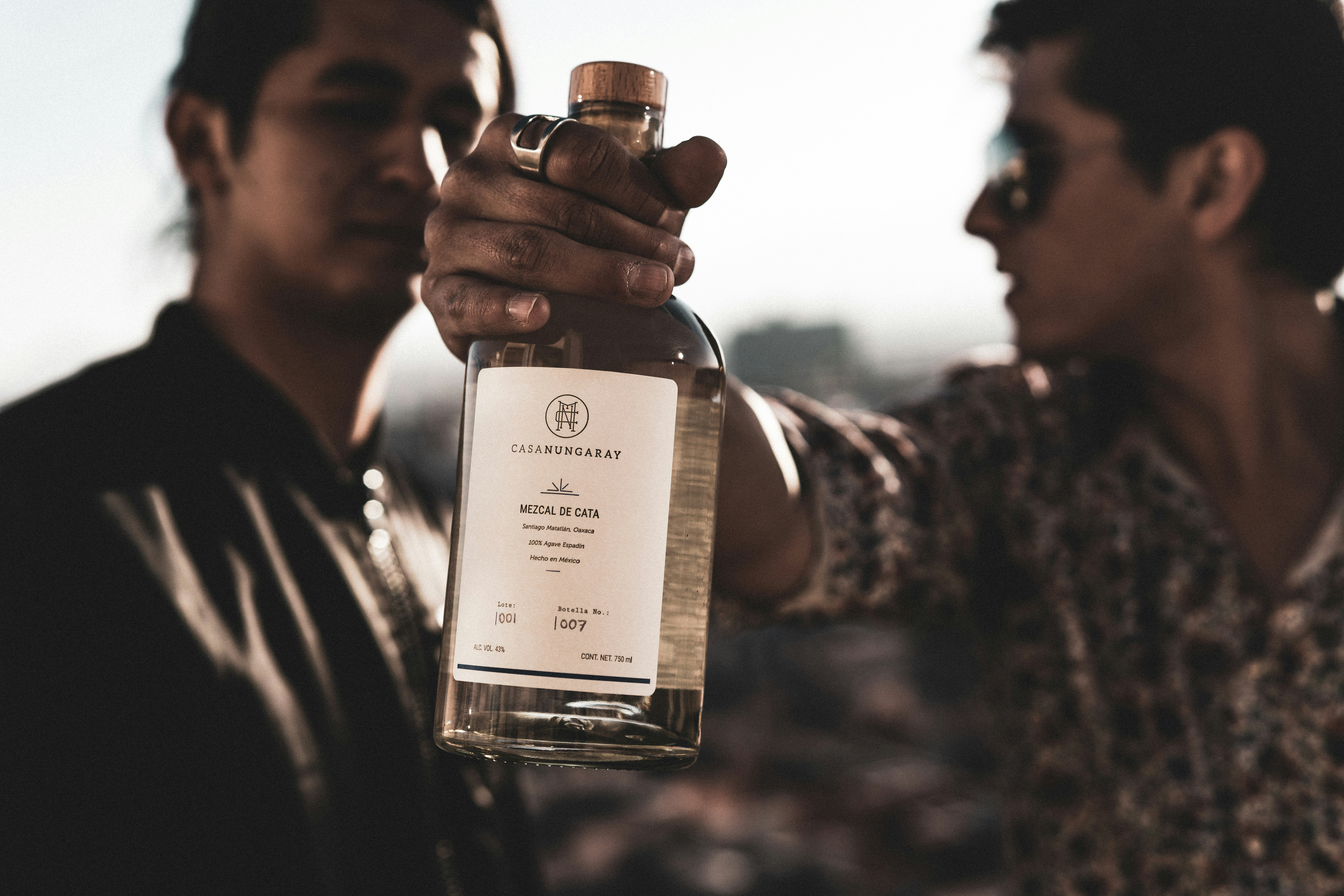 person holding bottleSayo Garcia