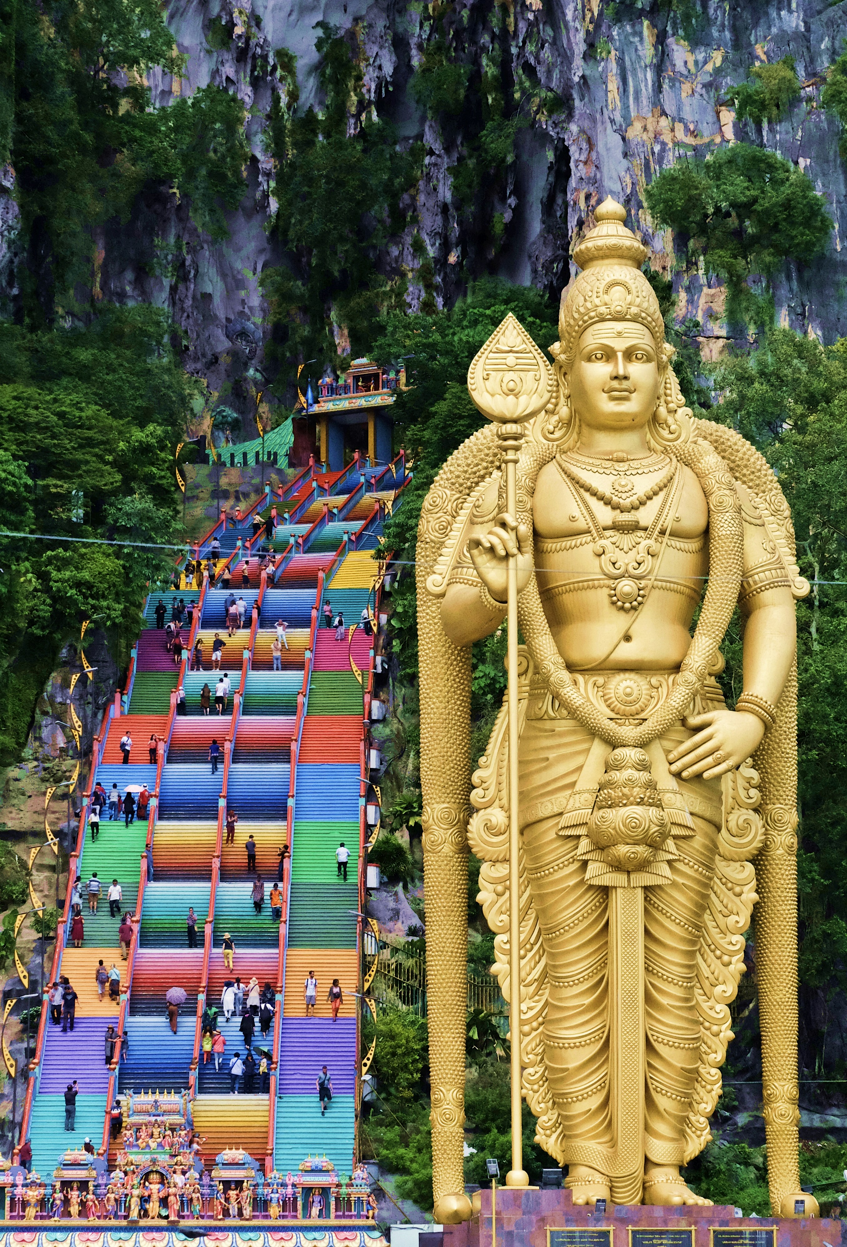 Golden Guardian over Stairways of Colorful Steps