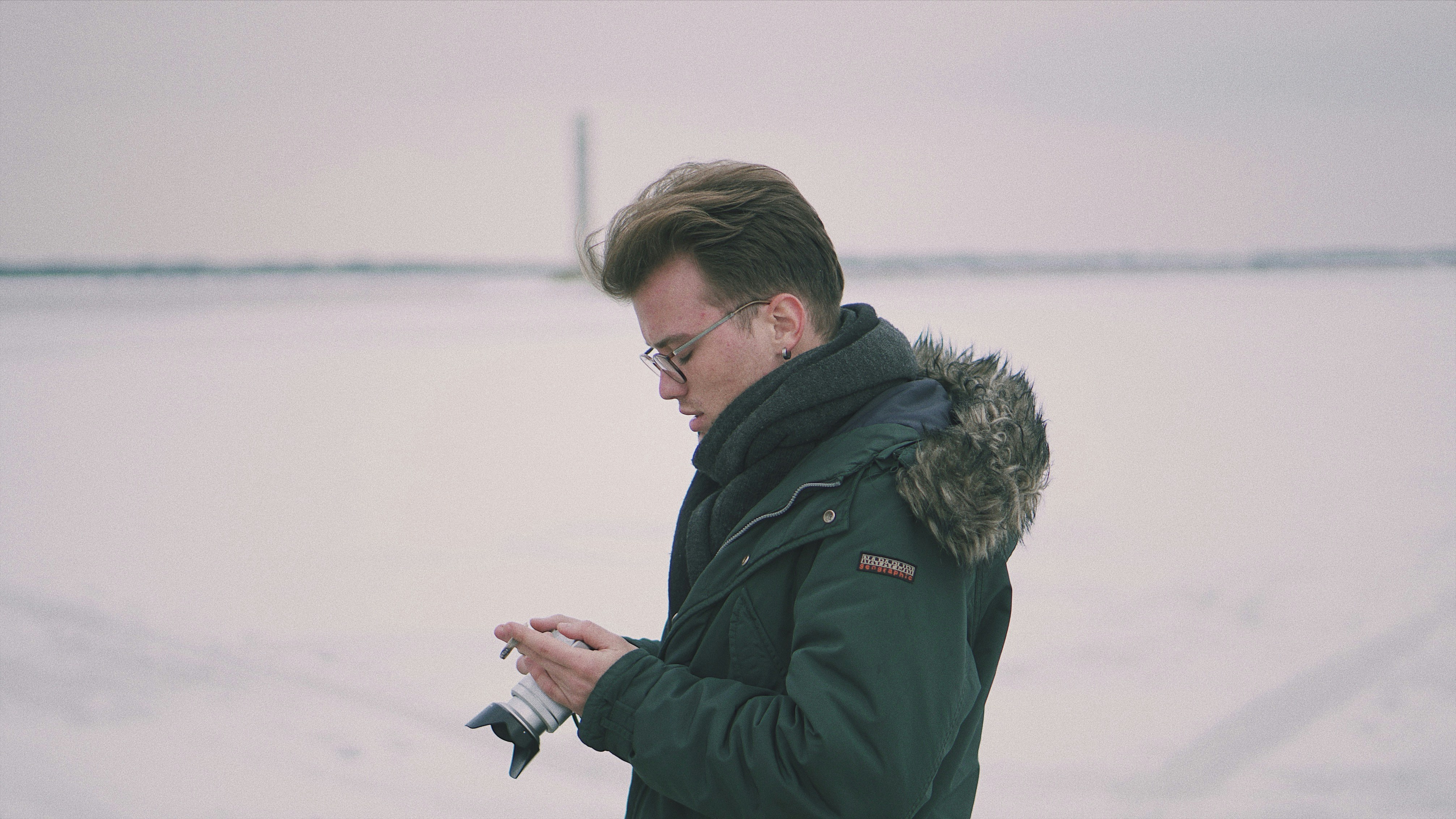 Winter Light, Steady Hands: A Quiet Portrait by the Snow-Covered Sea
