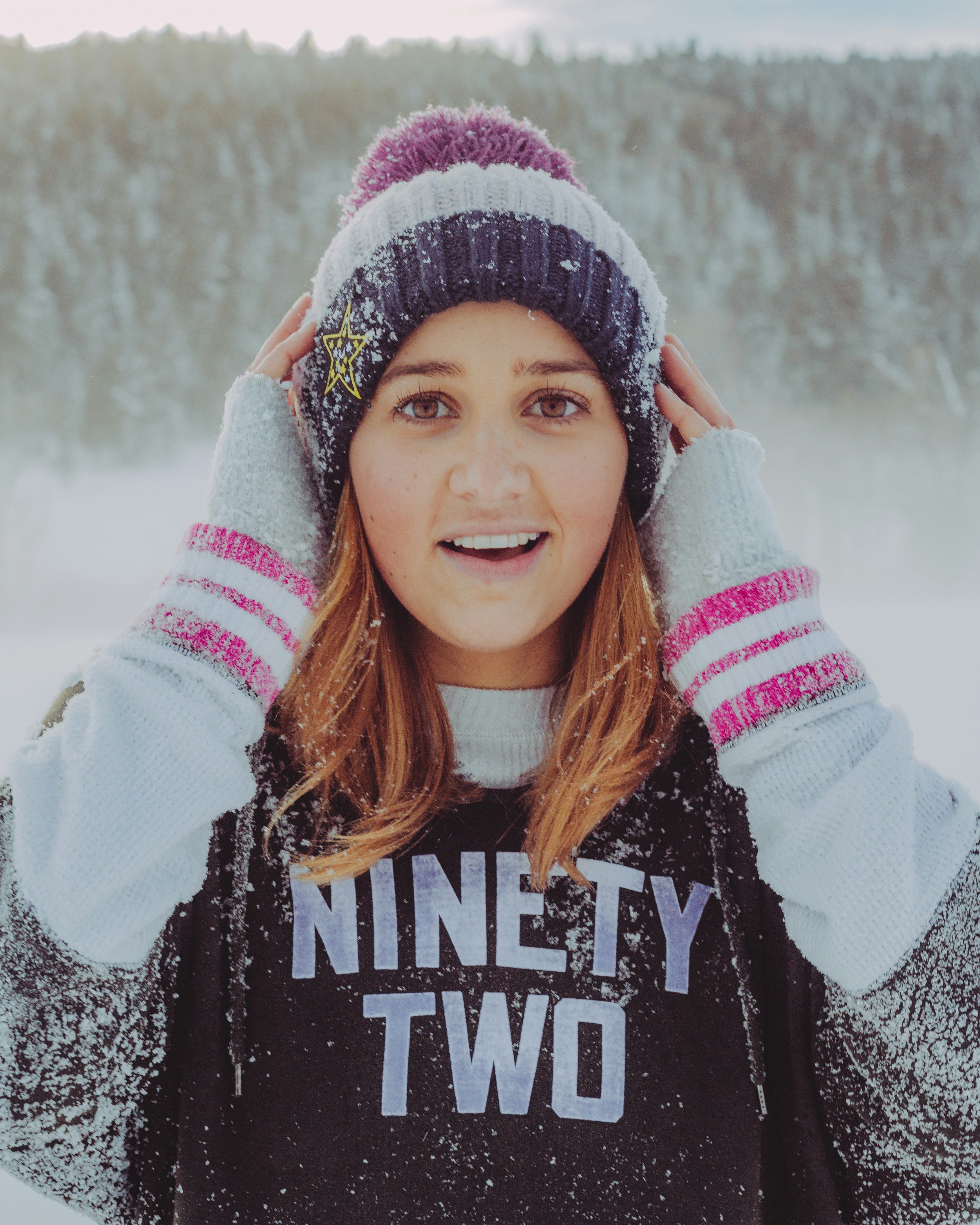 Snow-Kissed Portrait: Winter Light and a Starry Beanie