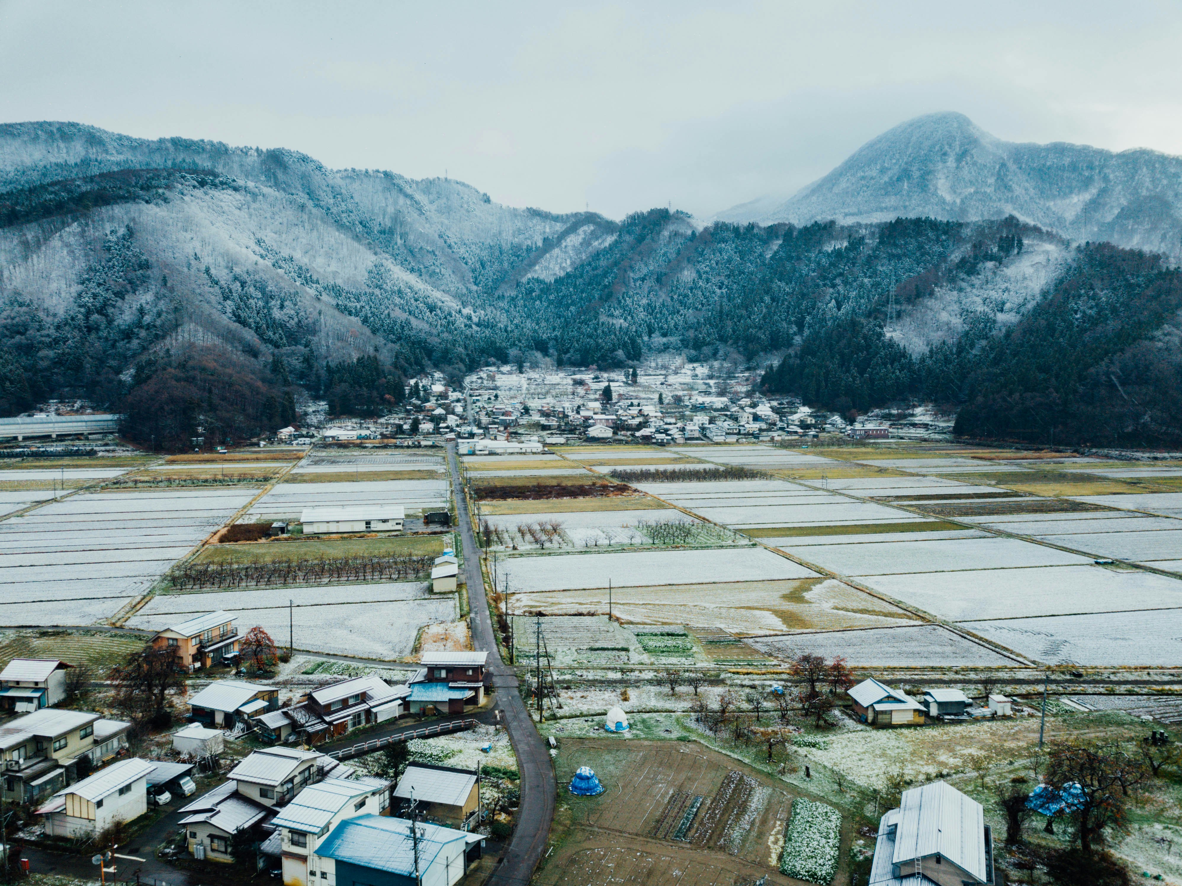 Village near mountain during daytime photo – Free Grey Image on Unsplash