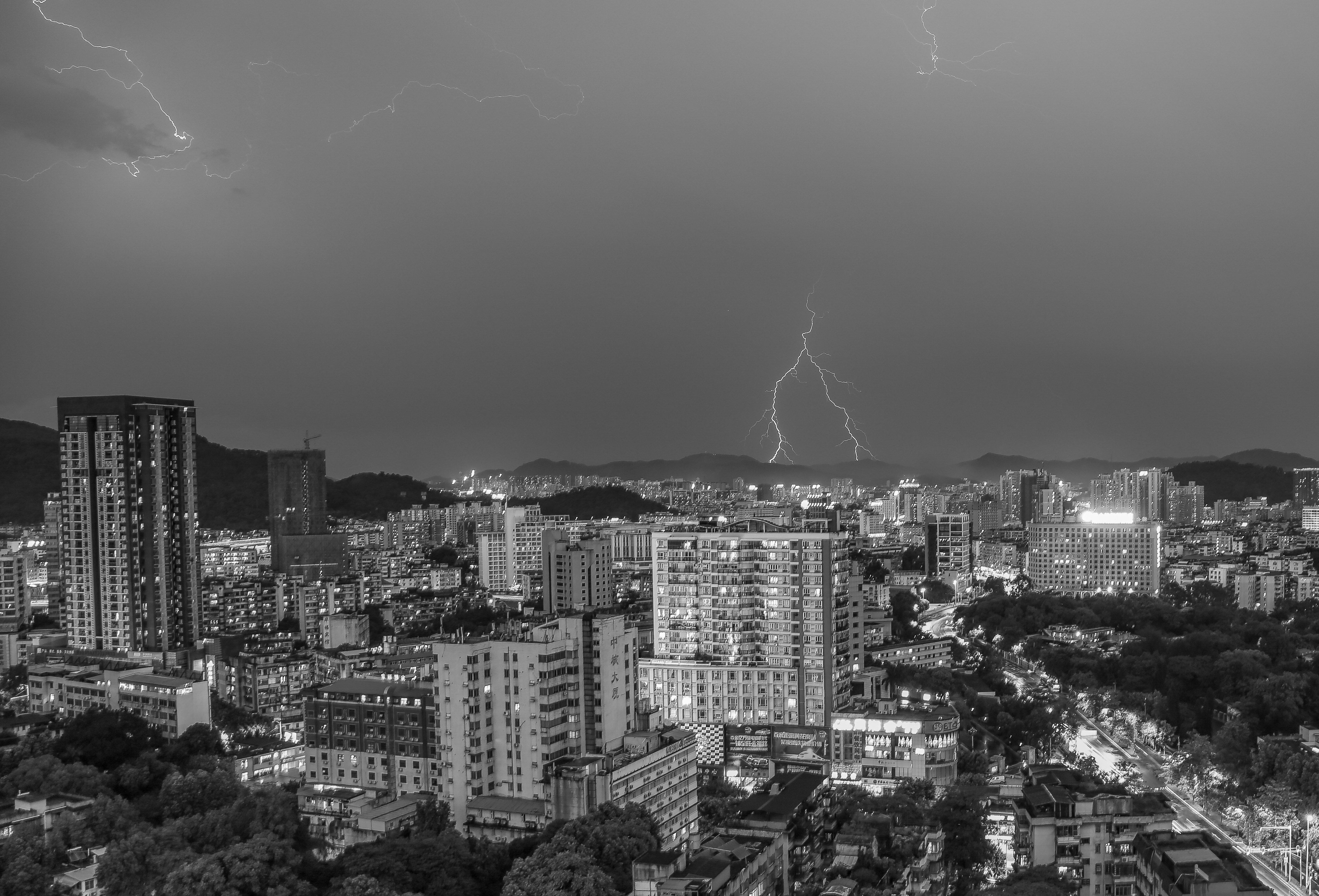 Midnight Gridquake: Lightning Arches Over a Monochrome City