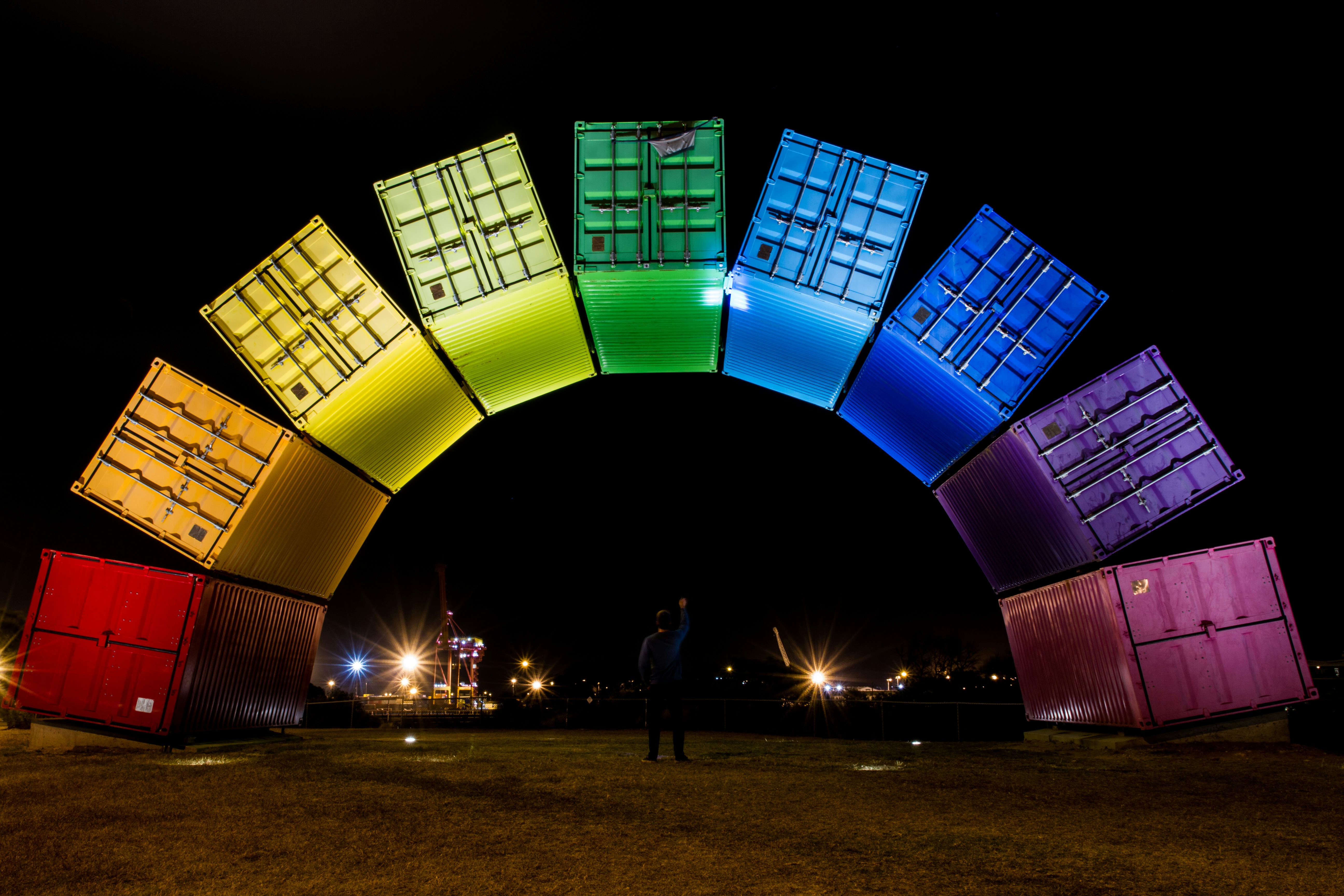 Arc of Color: Night Rainbow Arch of Shipping Containers