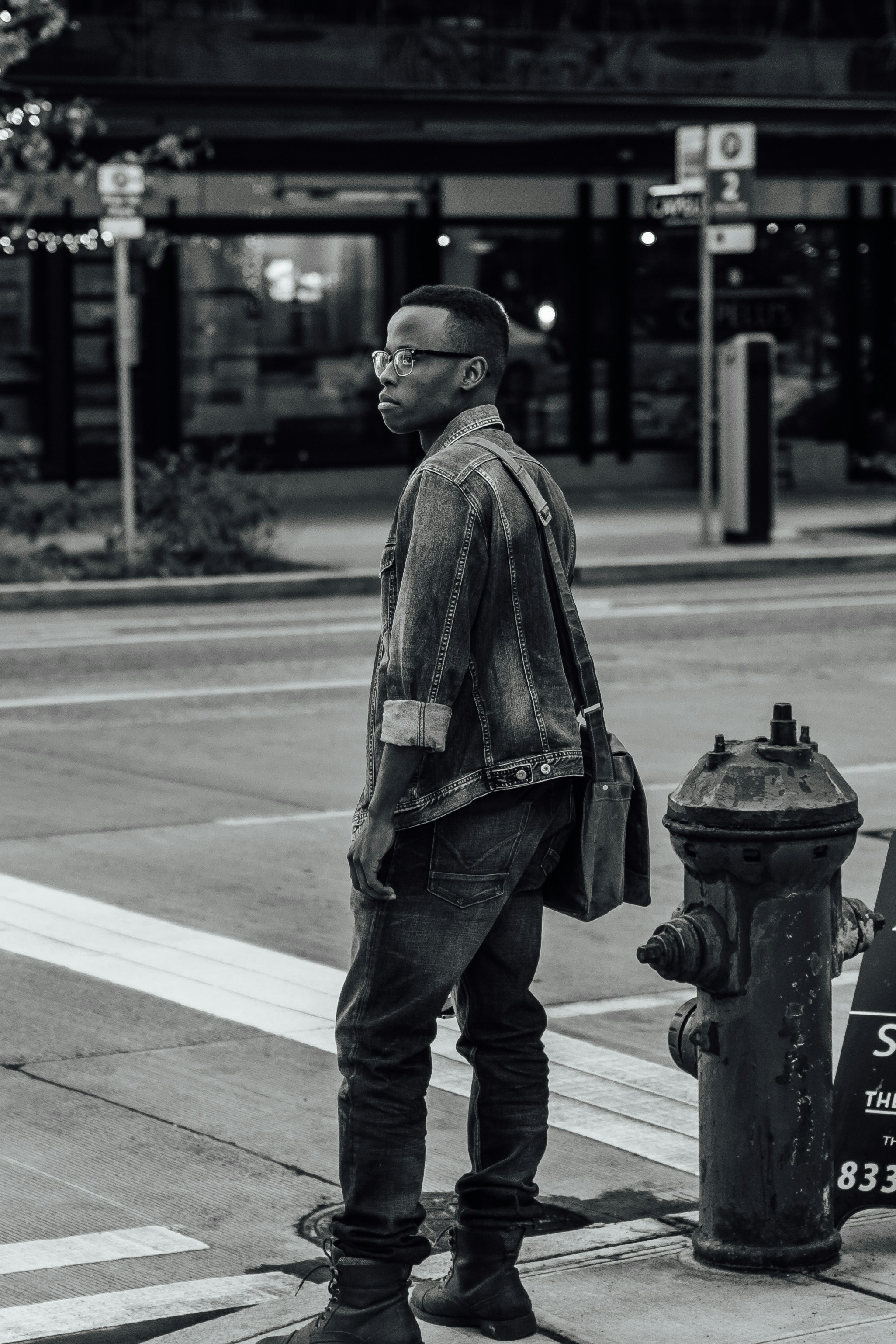 Crosswalk Quiet: A Portrait in Denim and Steel