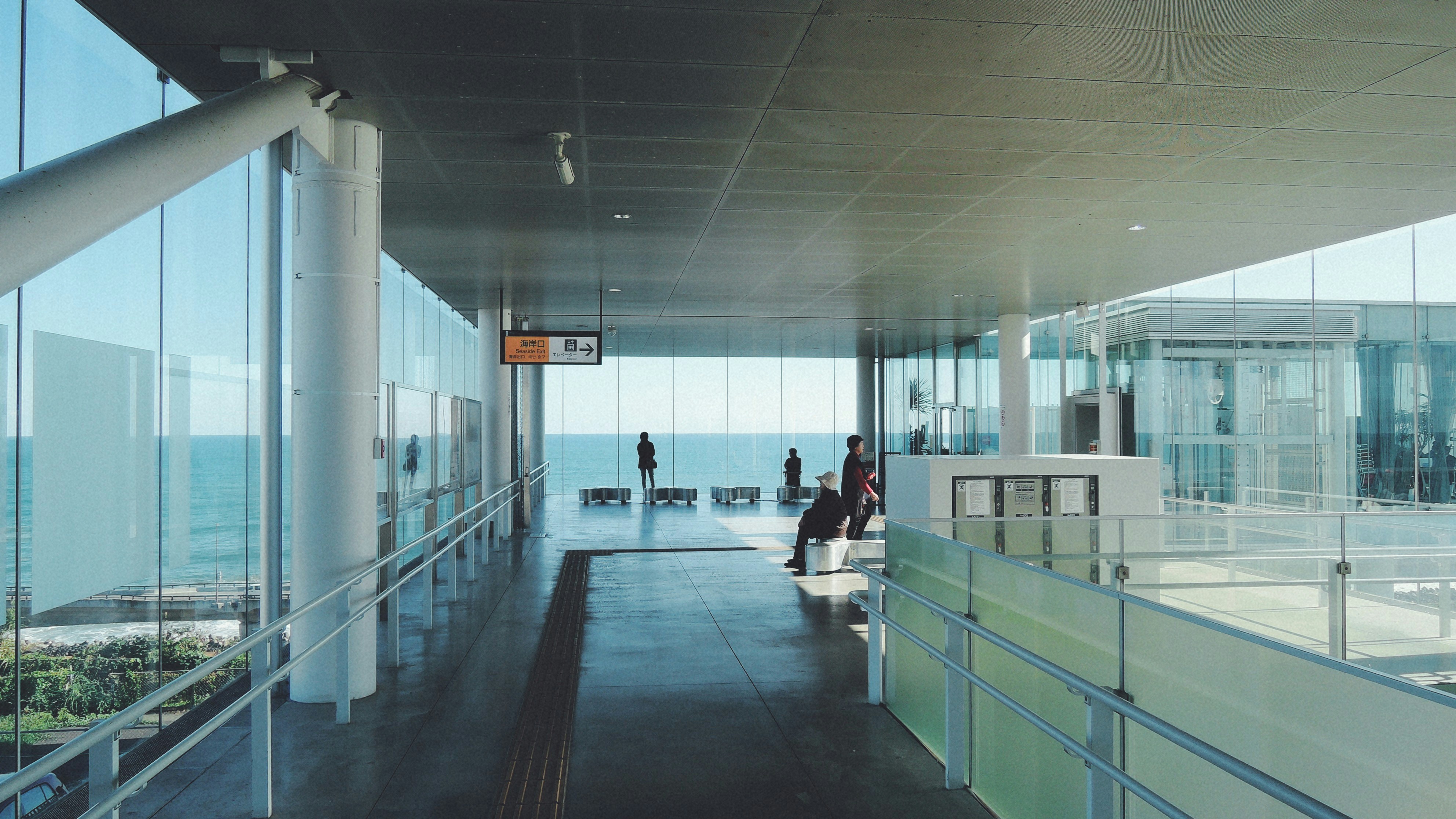 People standing inside building during daytime photo – Free Hitachi ...