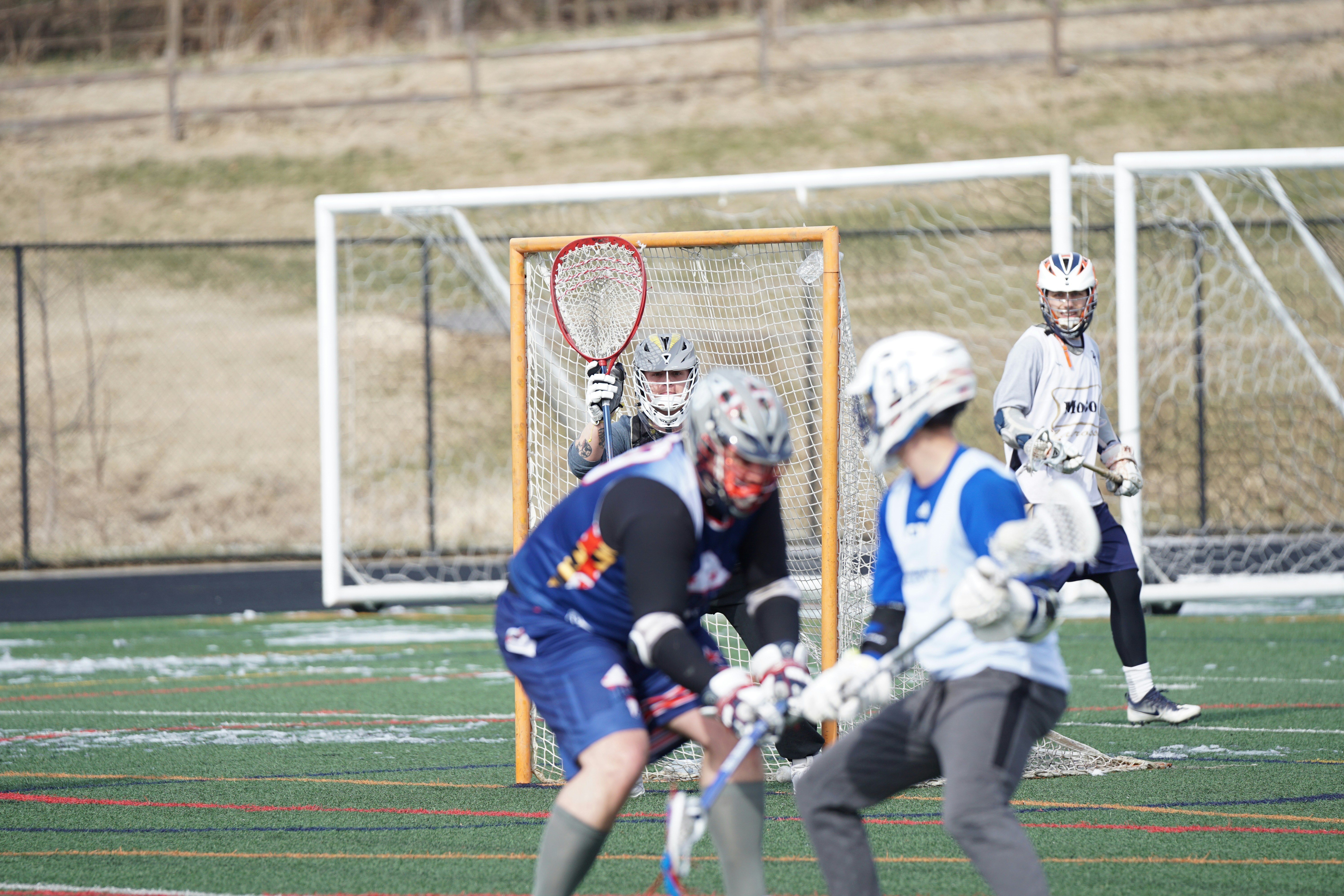 Man playing lacrosse photo – Free Person Image on Unsplash