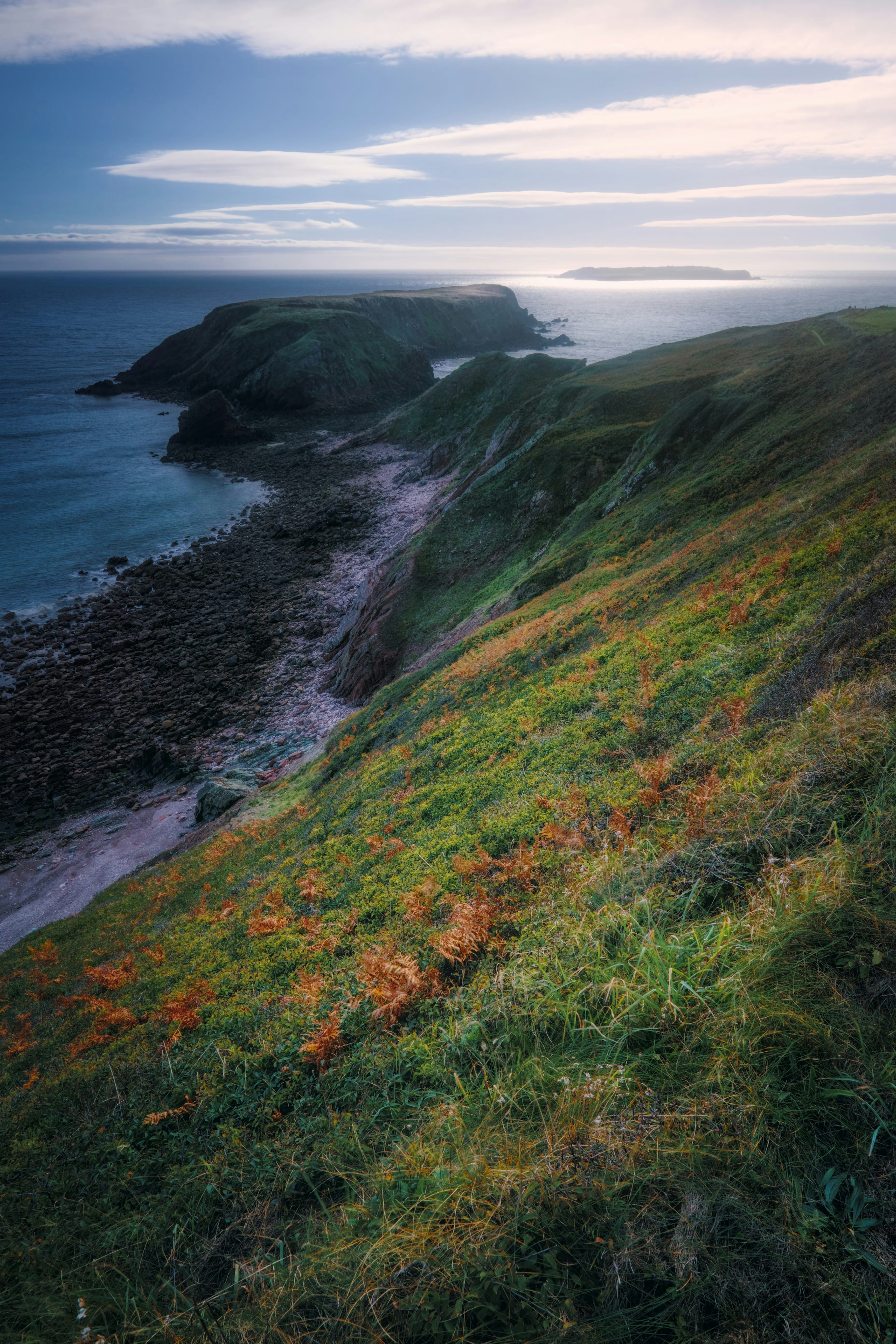 Emerald Cliffs Meeting the Atlantic Horizon