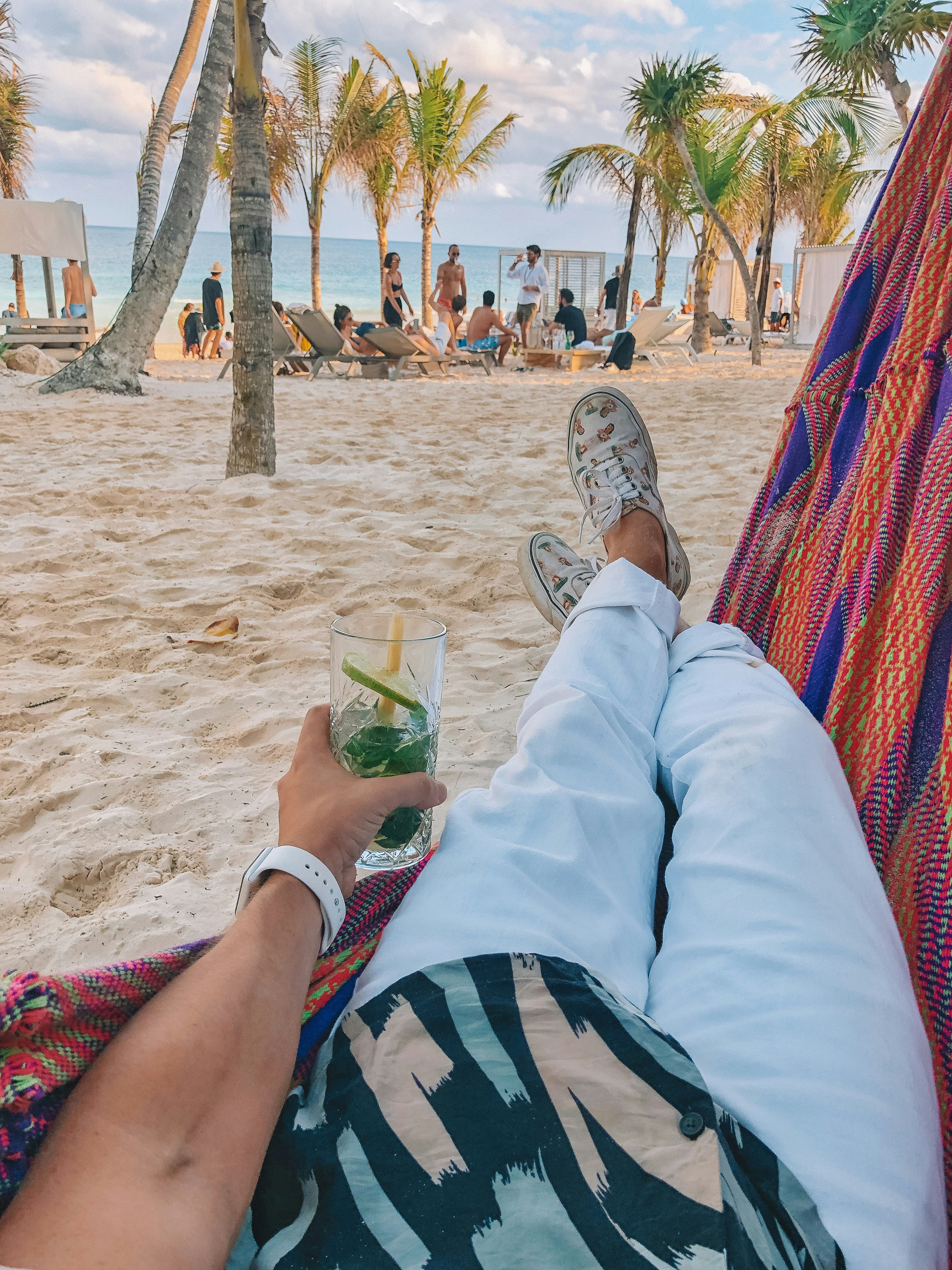 Relaxing on a hammock in the sun after traveling all day… nothing better than drinking a mojito on the beach. It’s calm, sunny, peaceful.