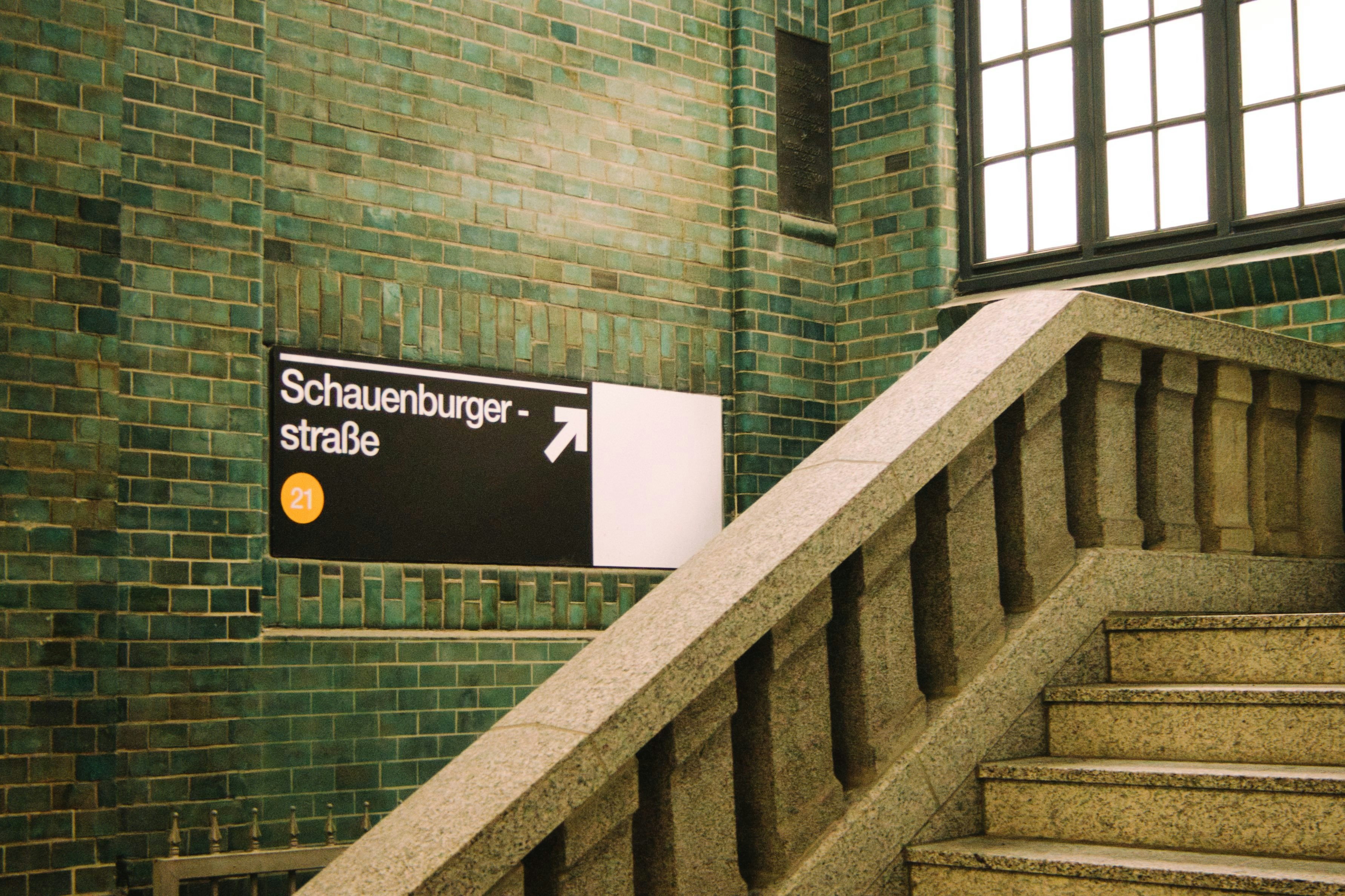 Green-tiled Staircase at Schauenburgerstraße Metro Entrance