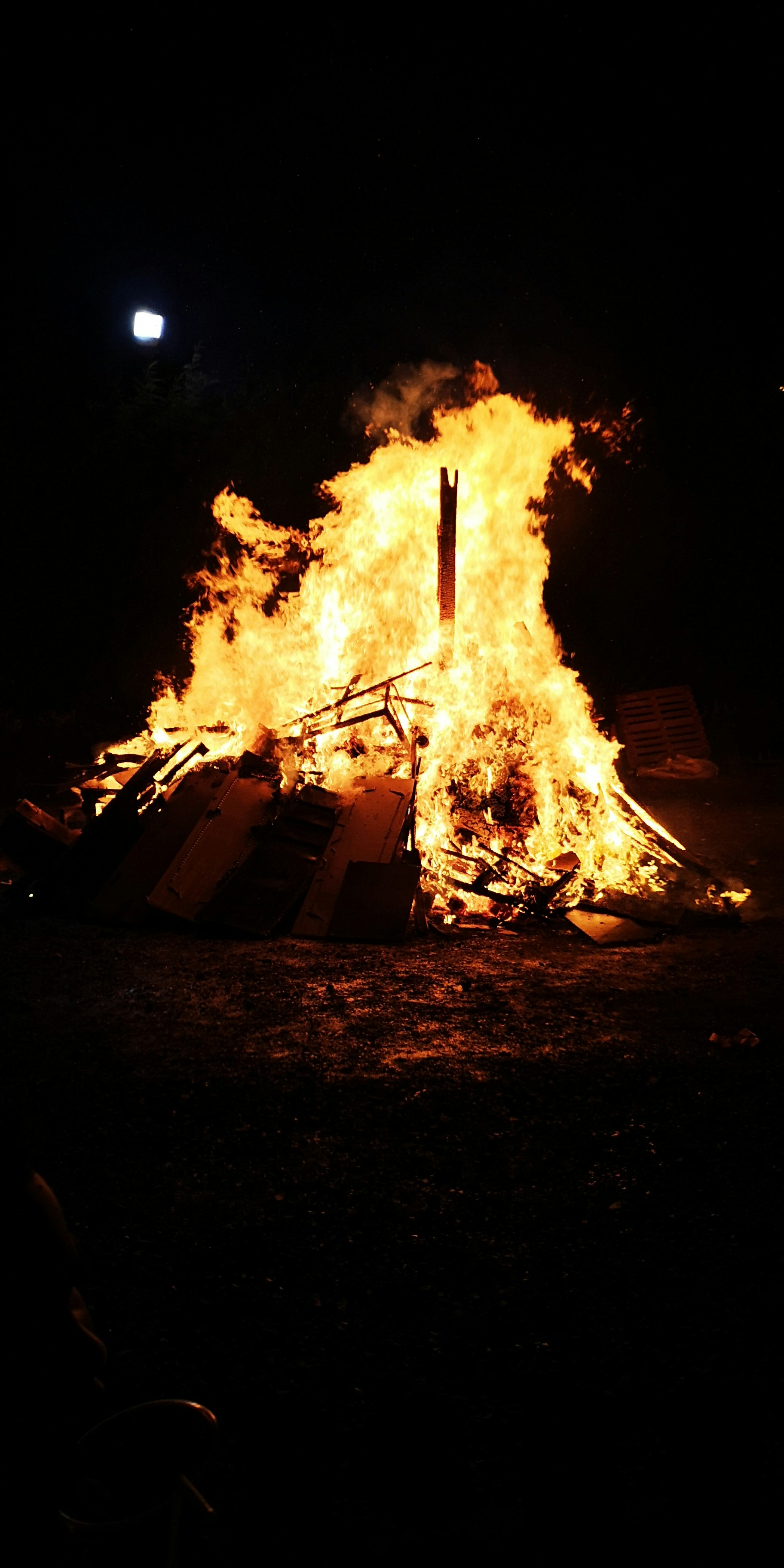 Inferno on the Night Plain: A Bonfire of Plywood and Pallets
