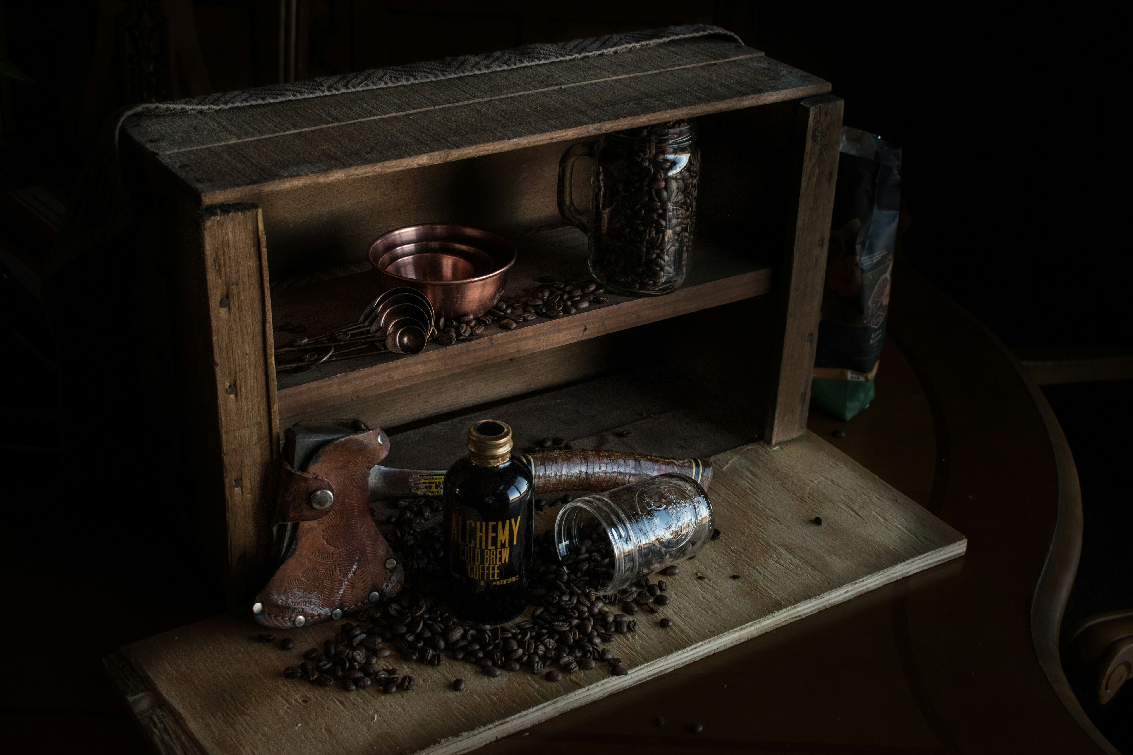 glass jar spilled on brown wooden rack