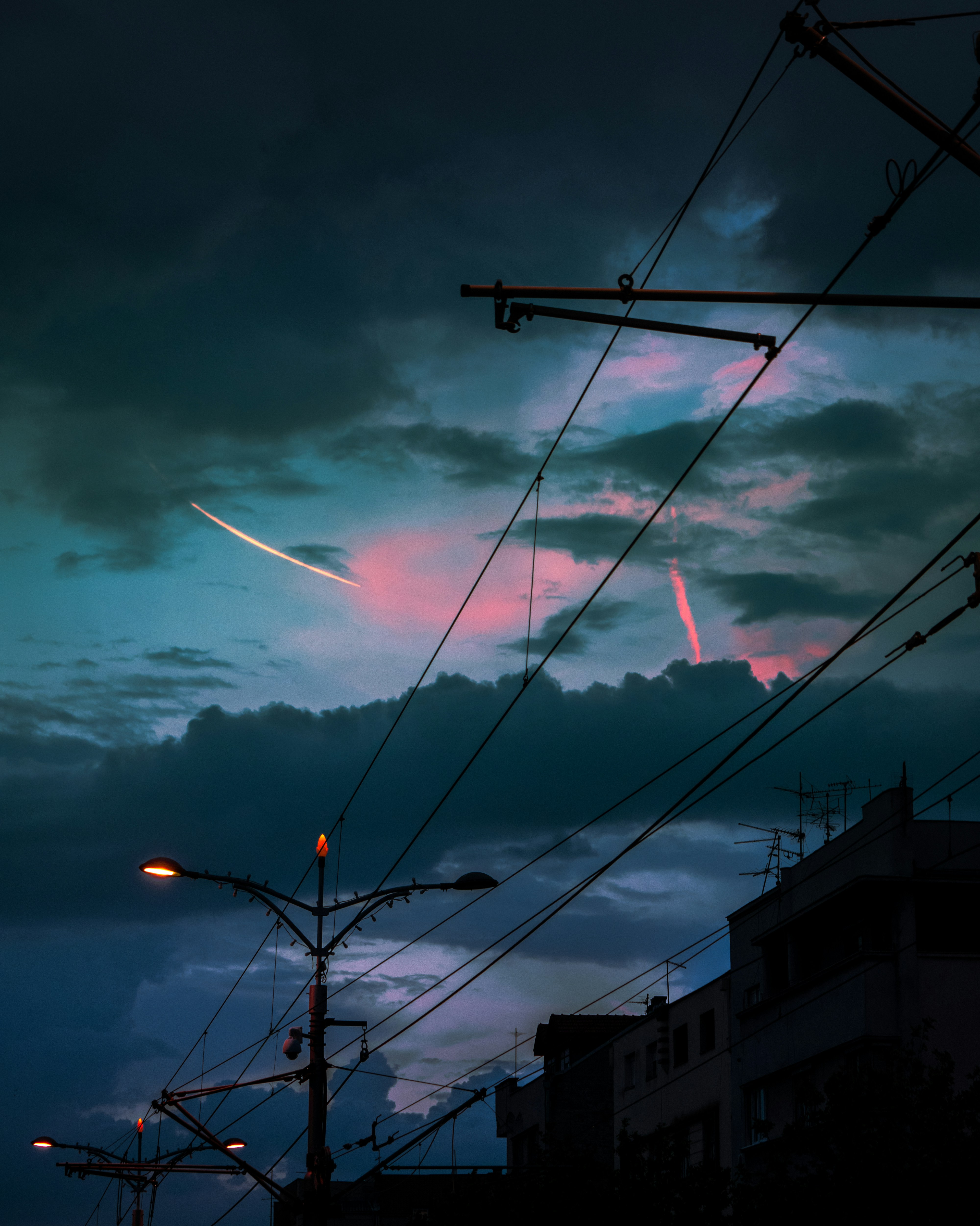 Neon Skyfire Over Urban Wires