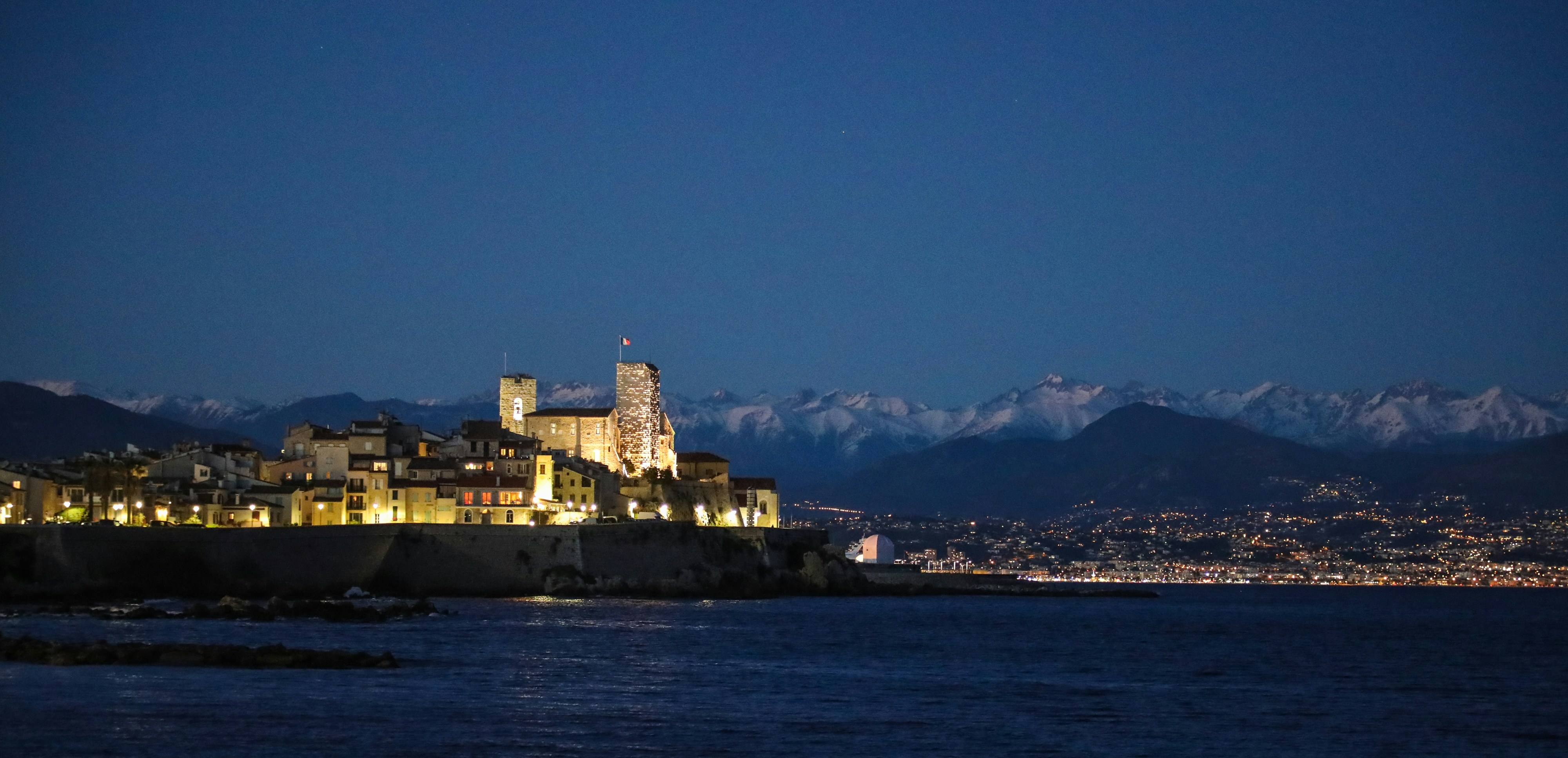 Twilight Over Antibes and Snowcapped Peaks