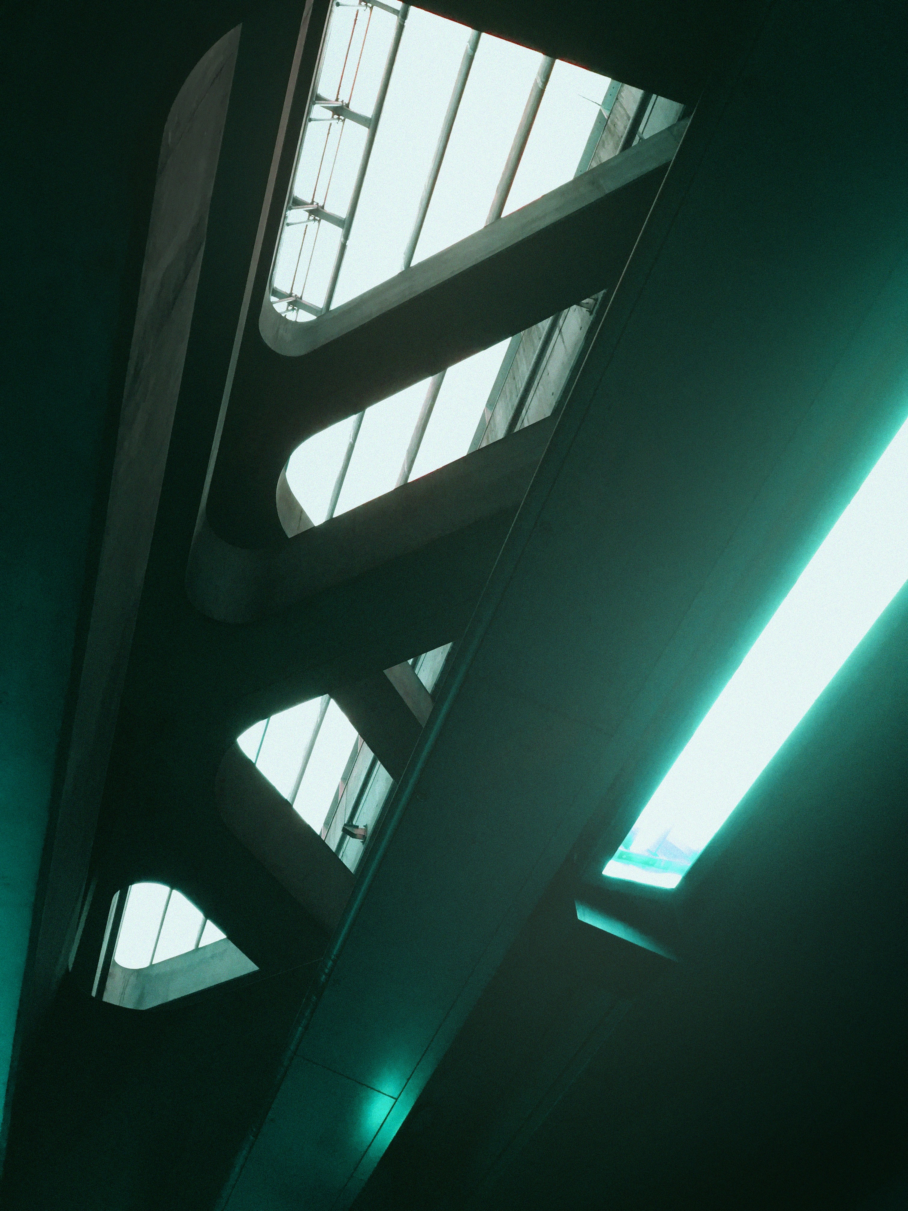 A very tall building with some very bright windows photo – Free ...