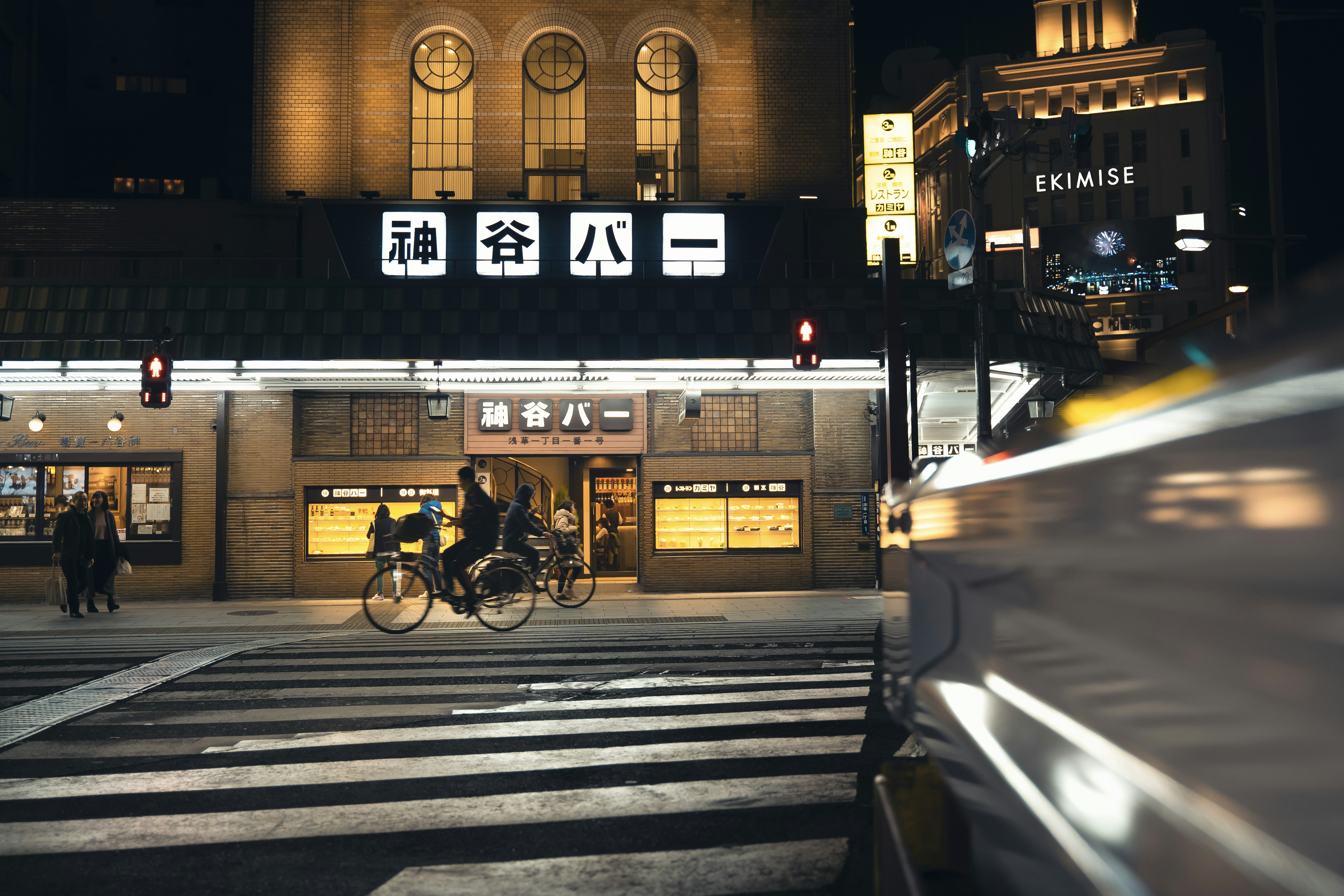 Person riding vehicle passing pedestrian lane photo – Free Asphalt ...