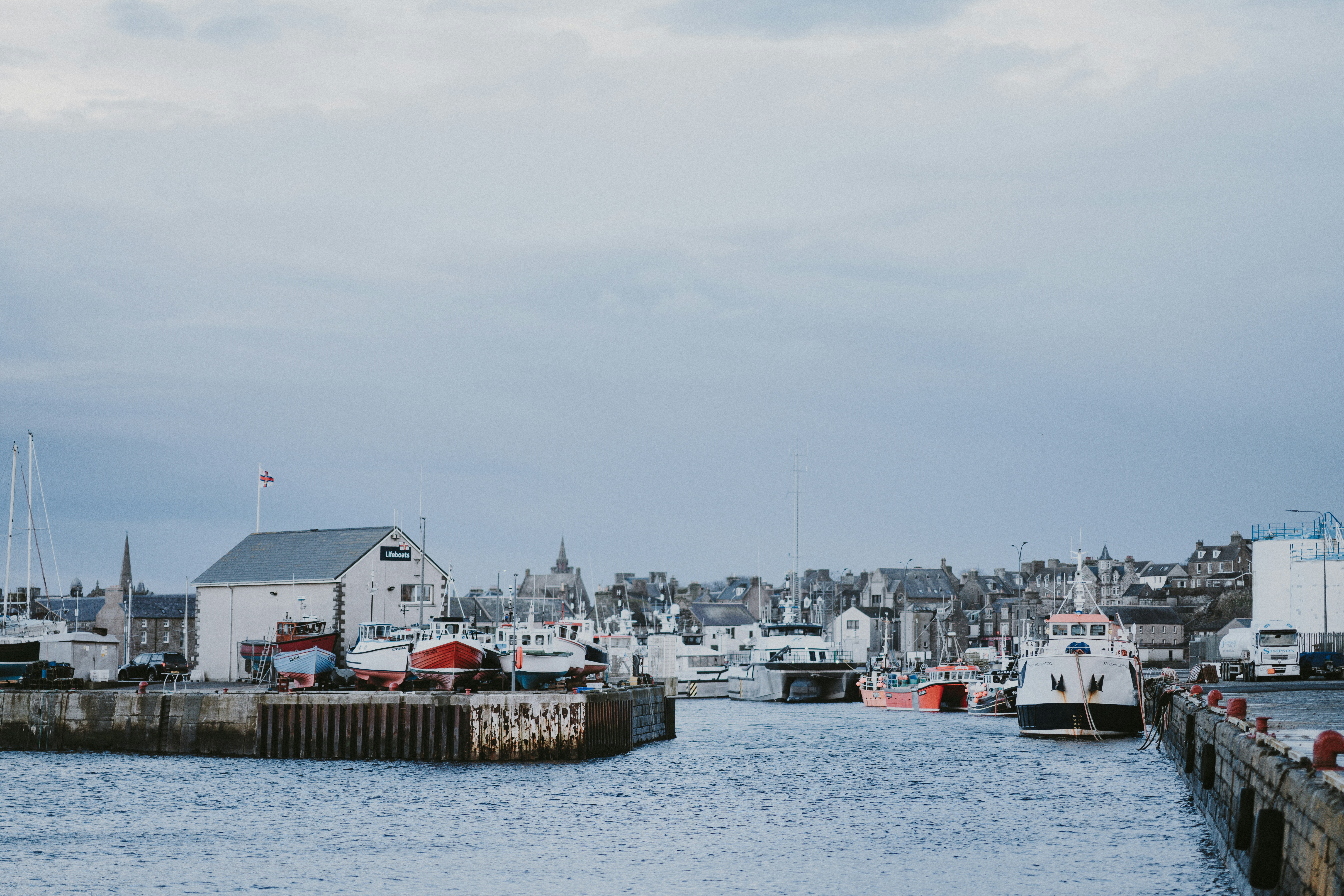 White boat on the docks photo – Free Blue Image on Unsplash