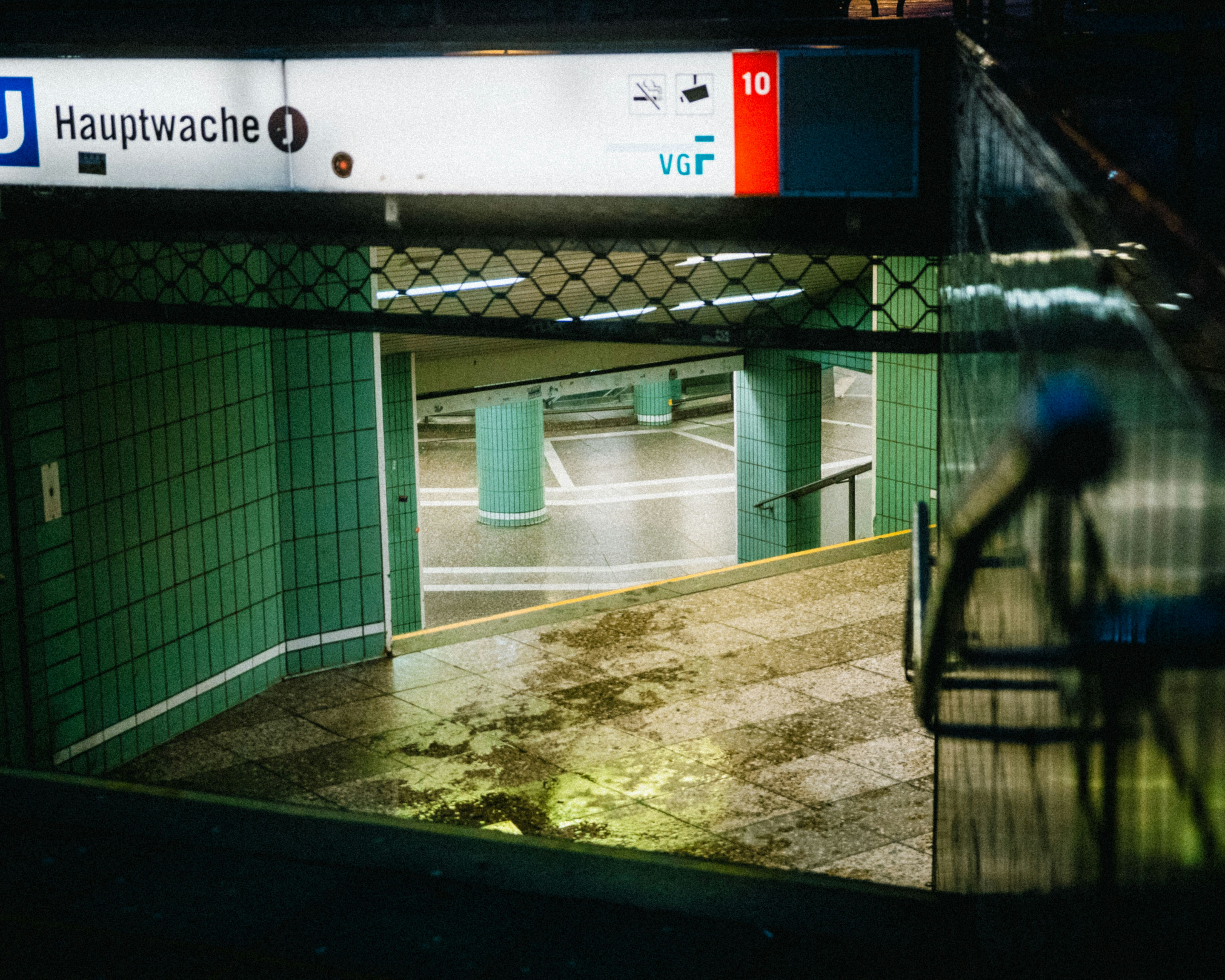 Emerald Threshold: Light at the End of the Green Subway Corridor