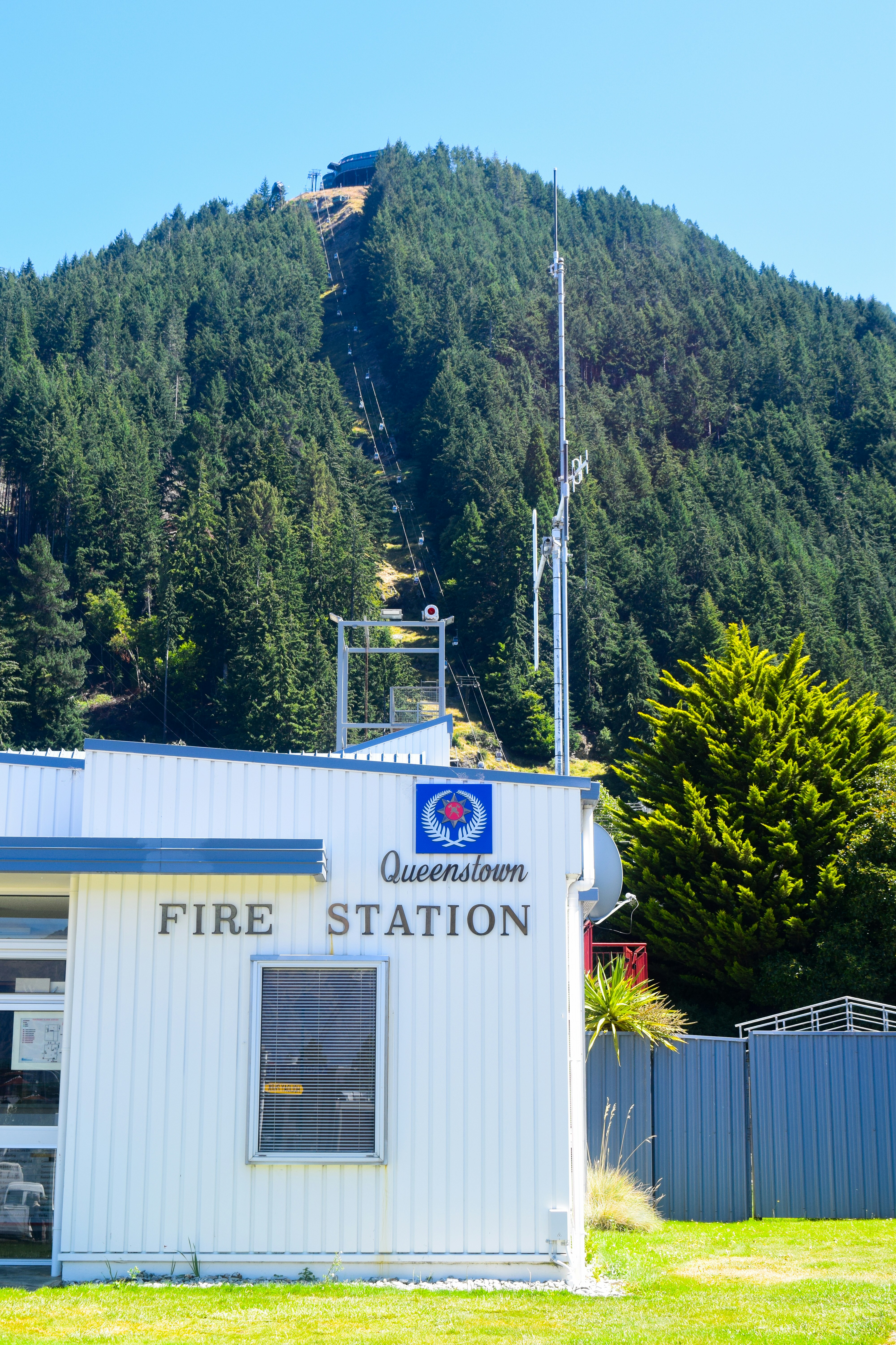fire station surrounded by trees