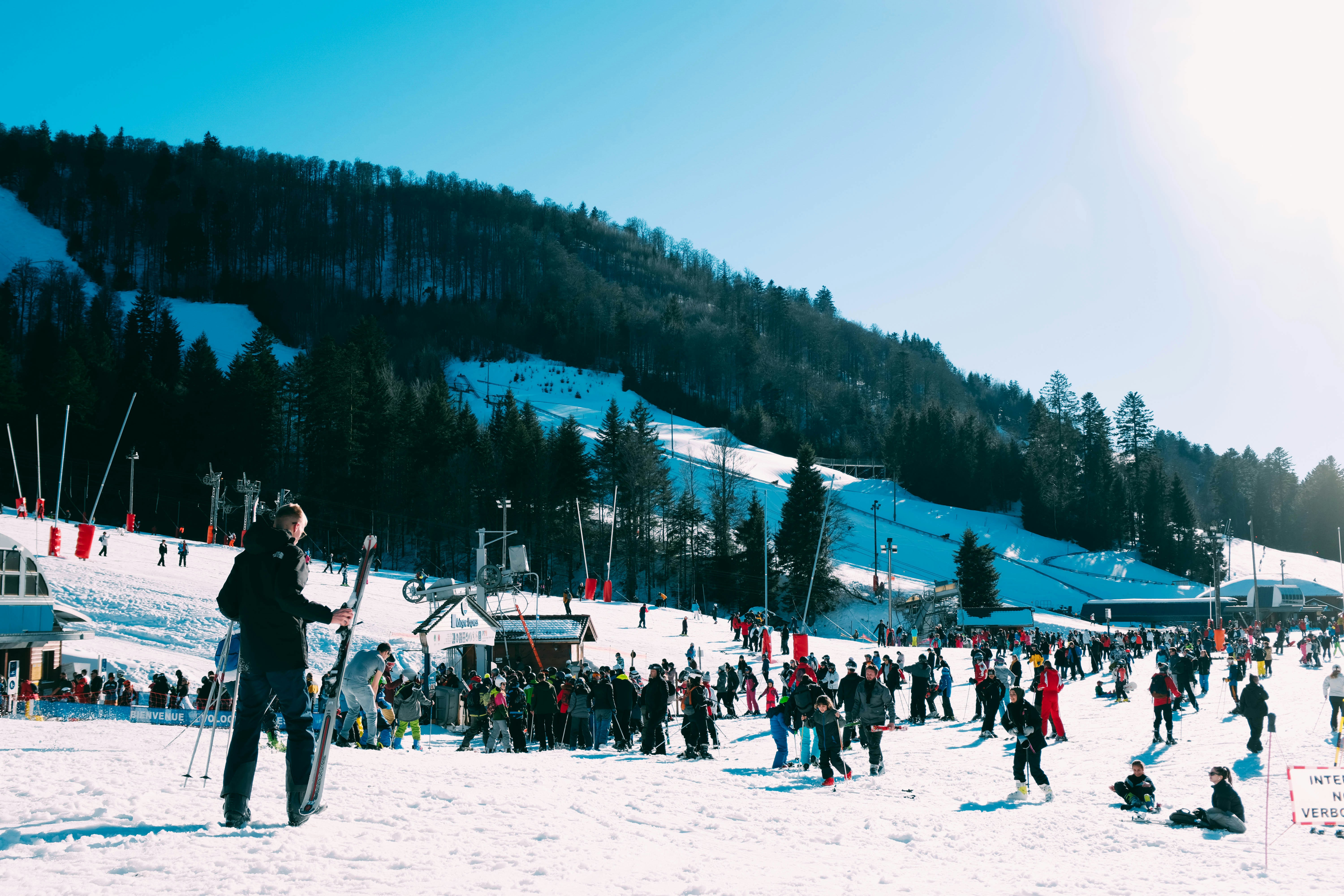 People stands on ski slope during day time photo – Free Human Image on ...