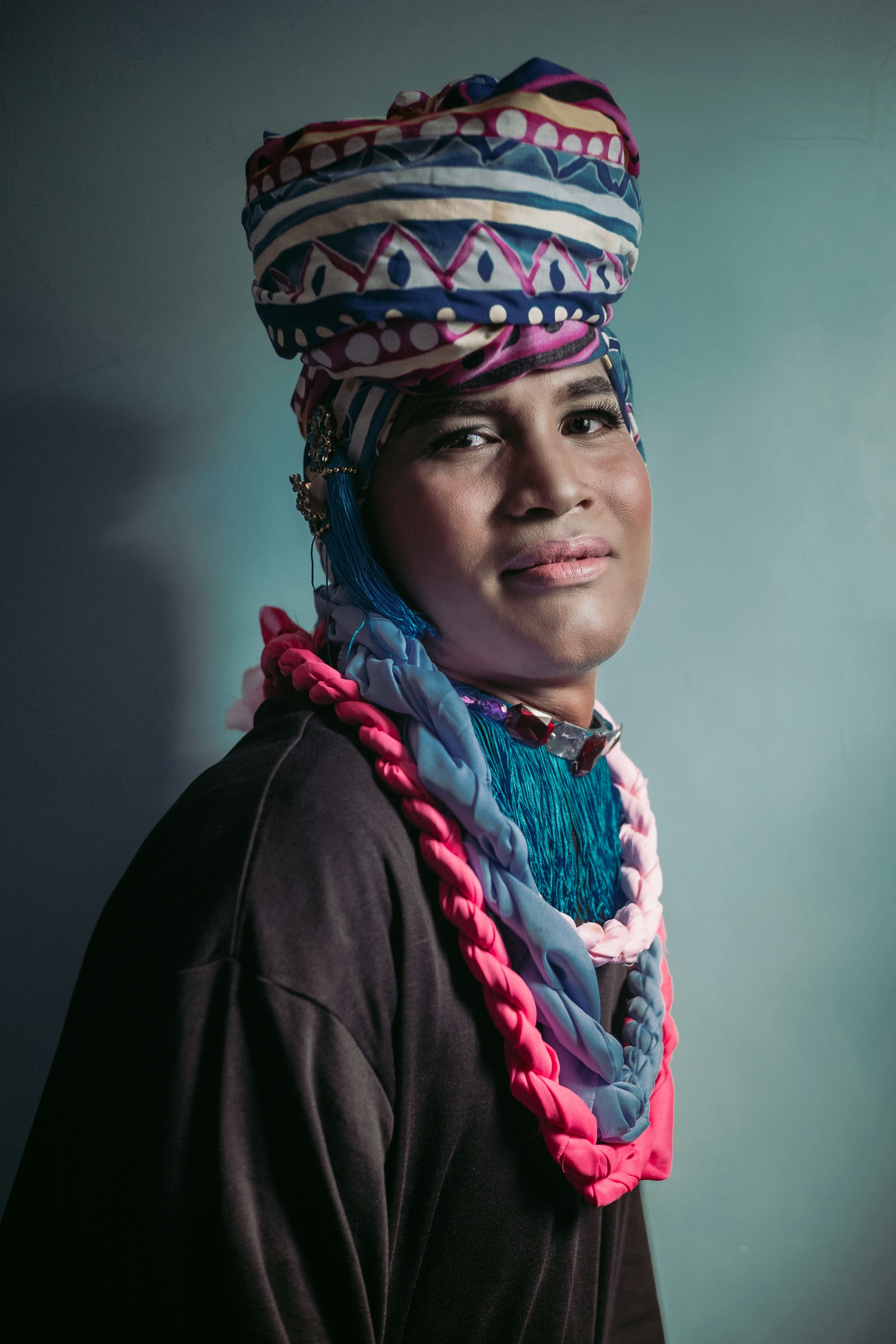 Colorwoven Turban Portrait: Threads of Color and Quiet Confidence