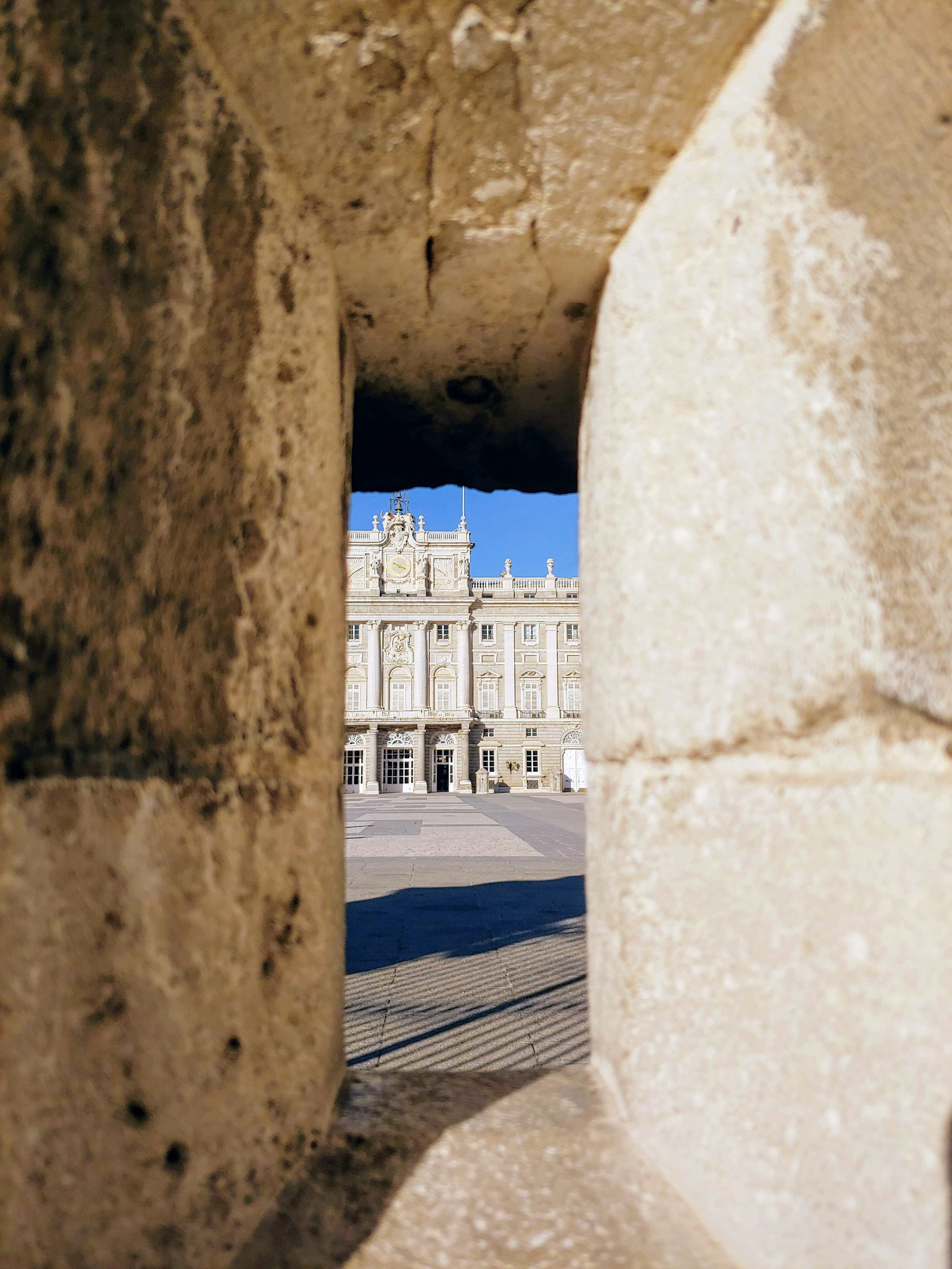 Framed Majesty: A Narrow Opening to a Palace Facade
