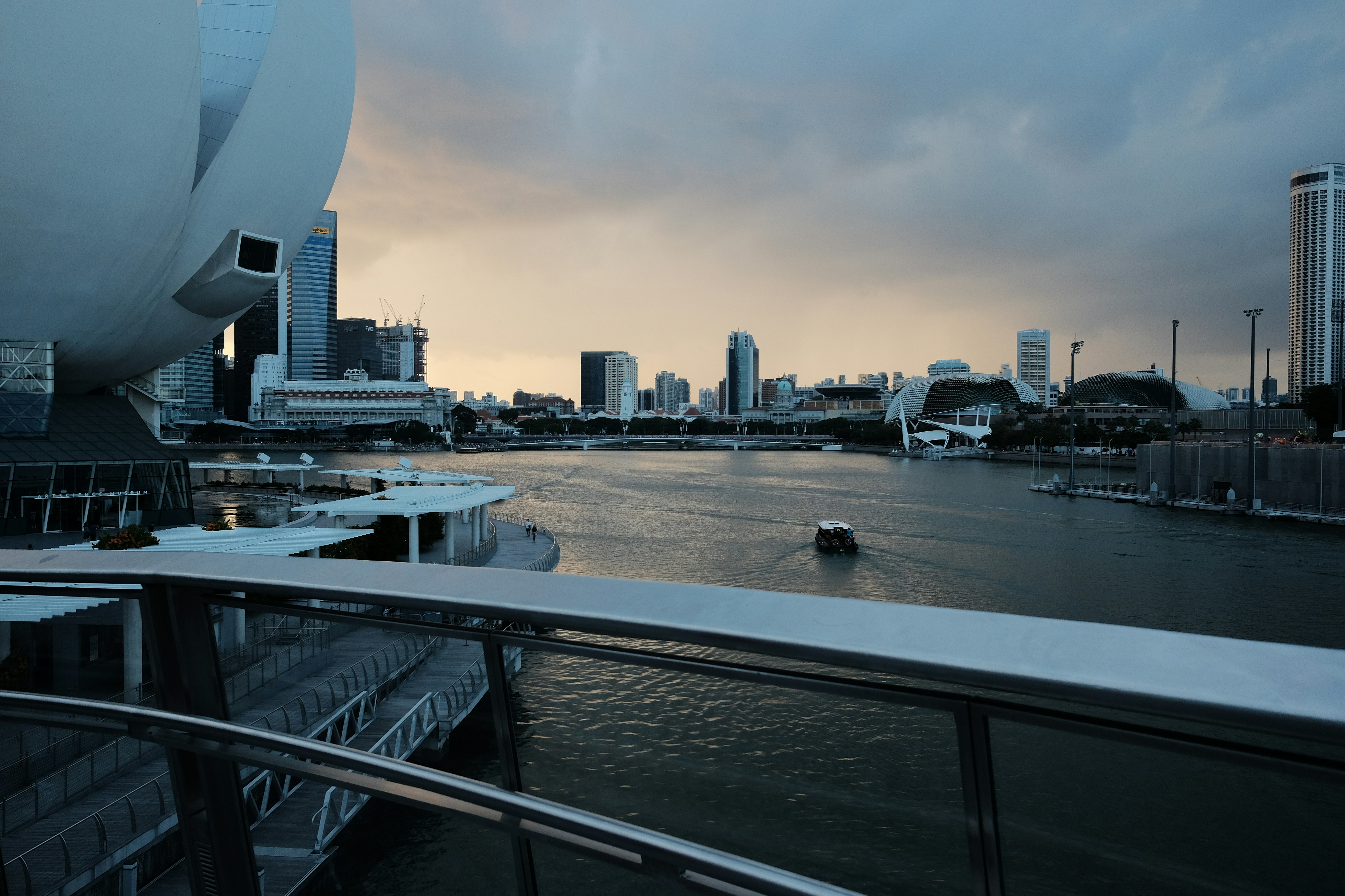 Ship on body of water between high-rise buildings photo – Free Railing ...