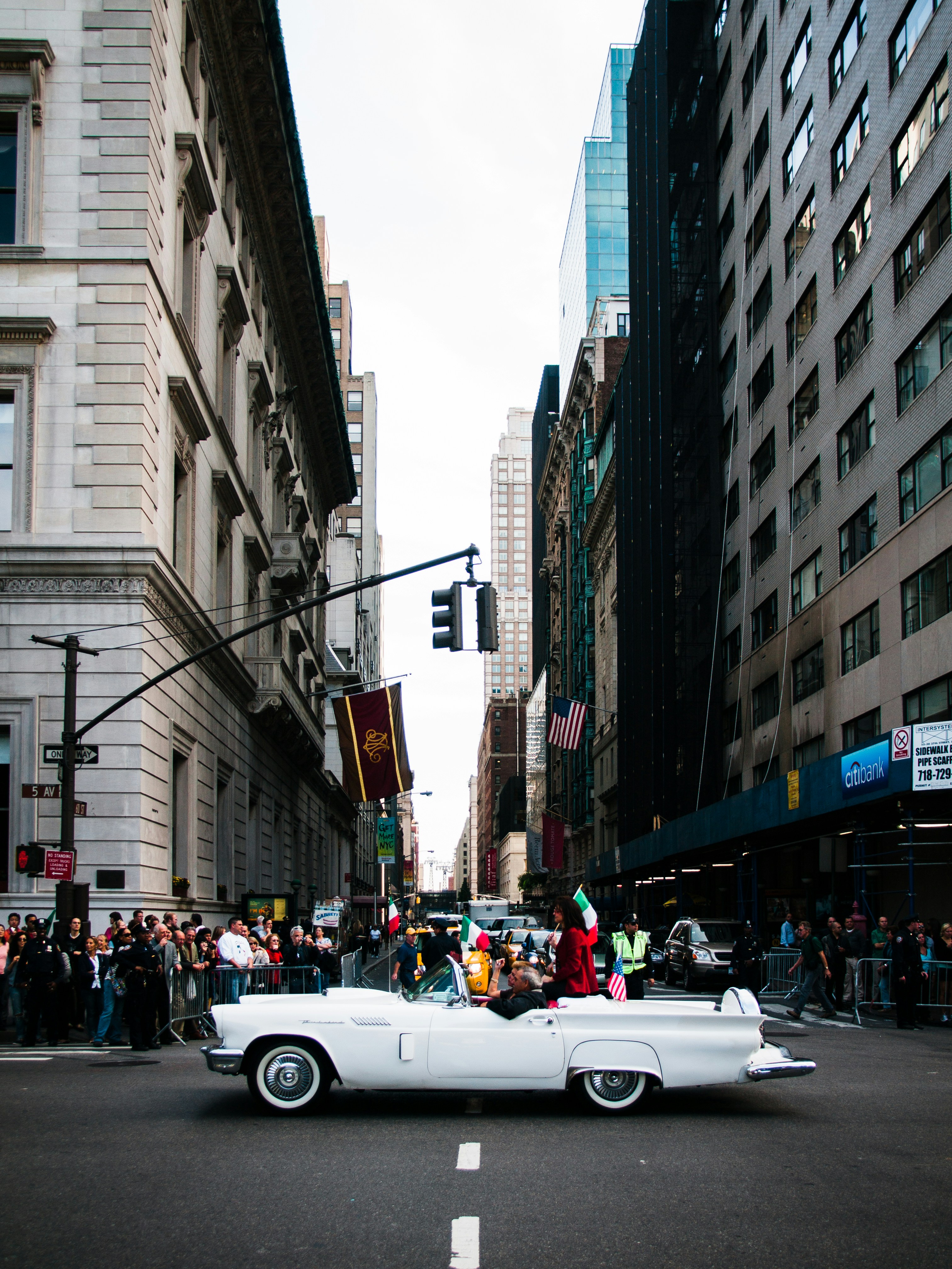 White car between buildings during daytime photo – Free Car Image on ...