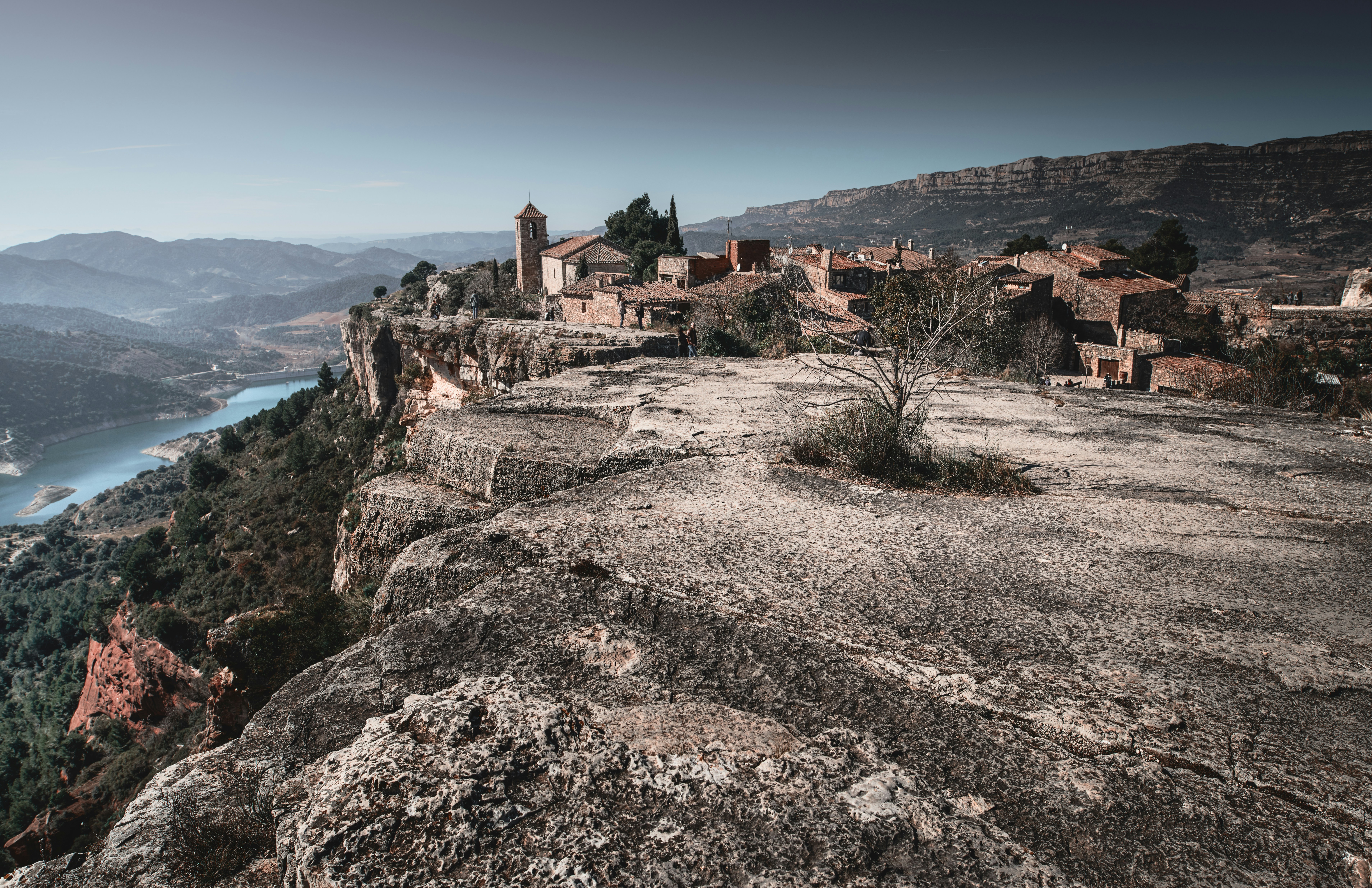 Clifftop Village Overlooking a Serene Valley