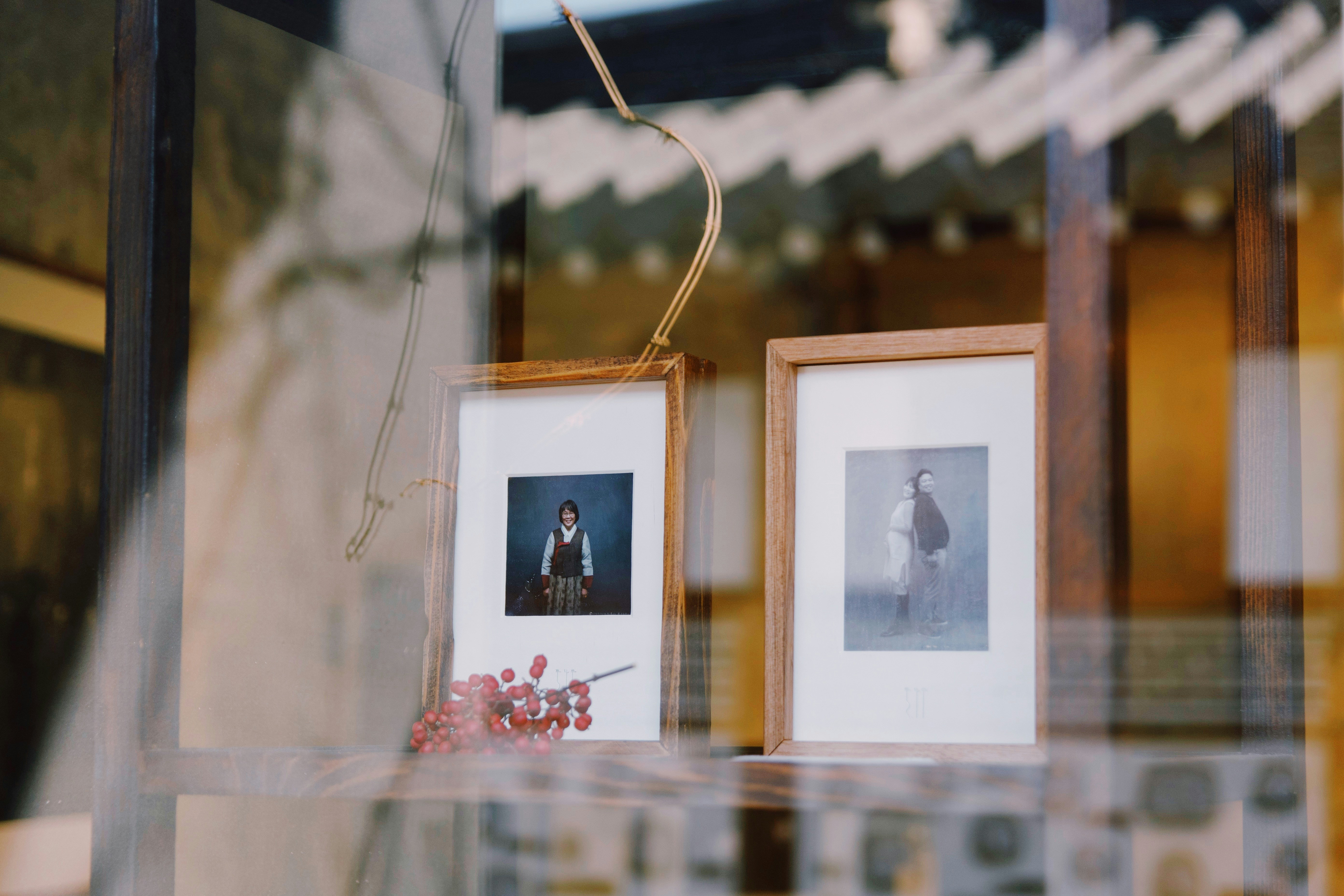 Two brown wooden photo frames photo – Free Portrait Image on Unsplash