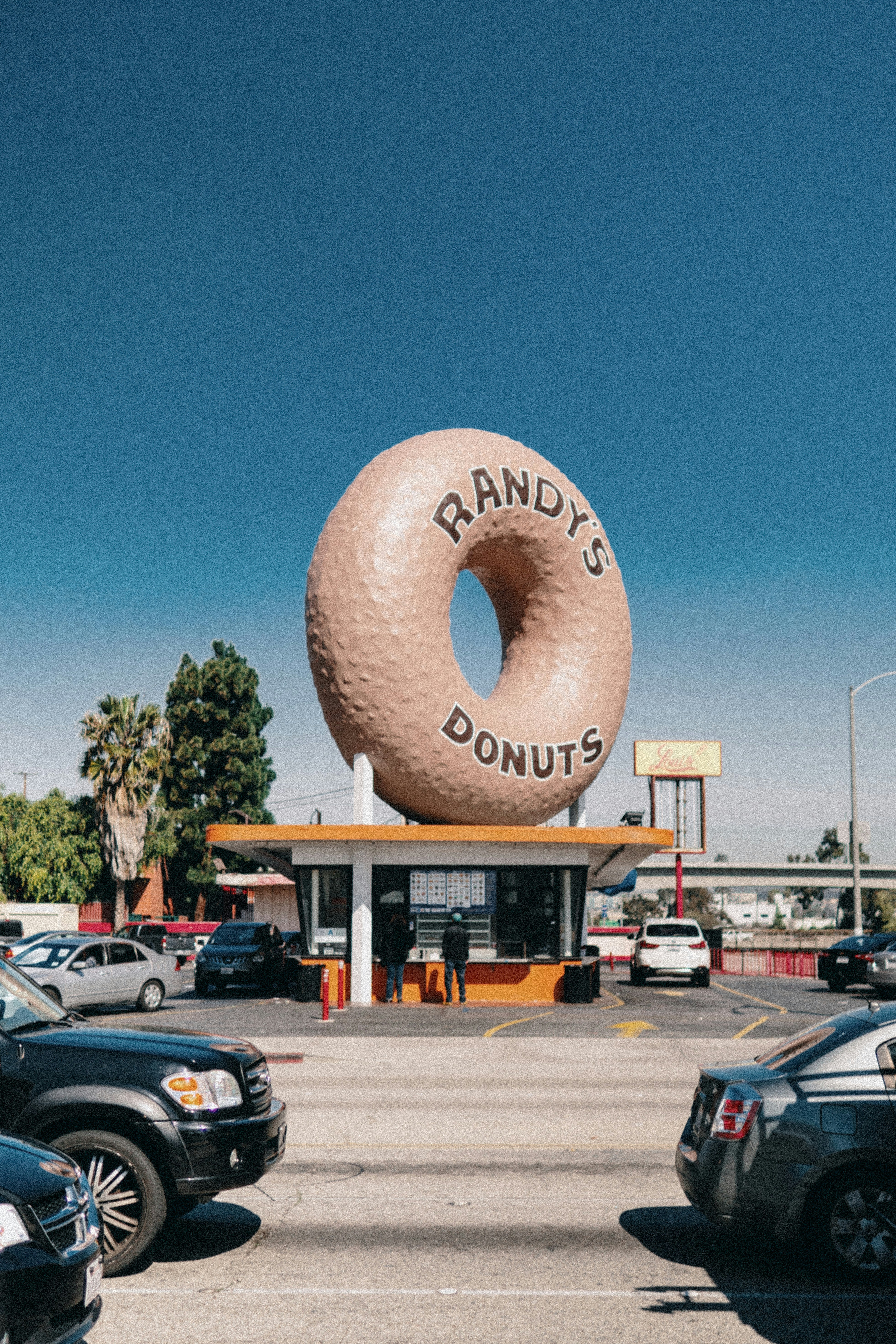 Giant Donut Monument over Randy's Donuts