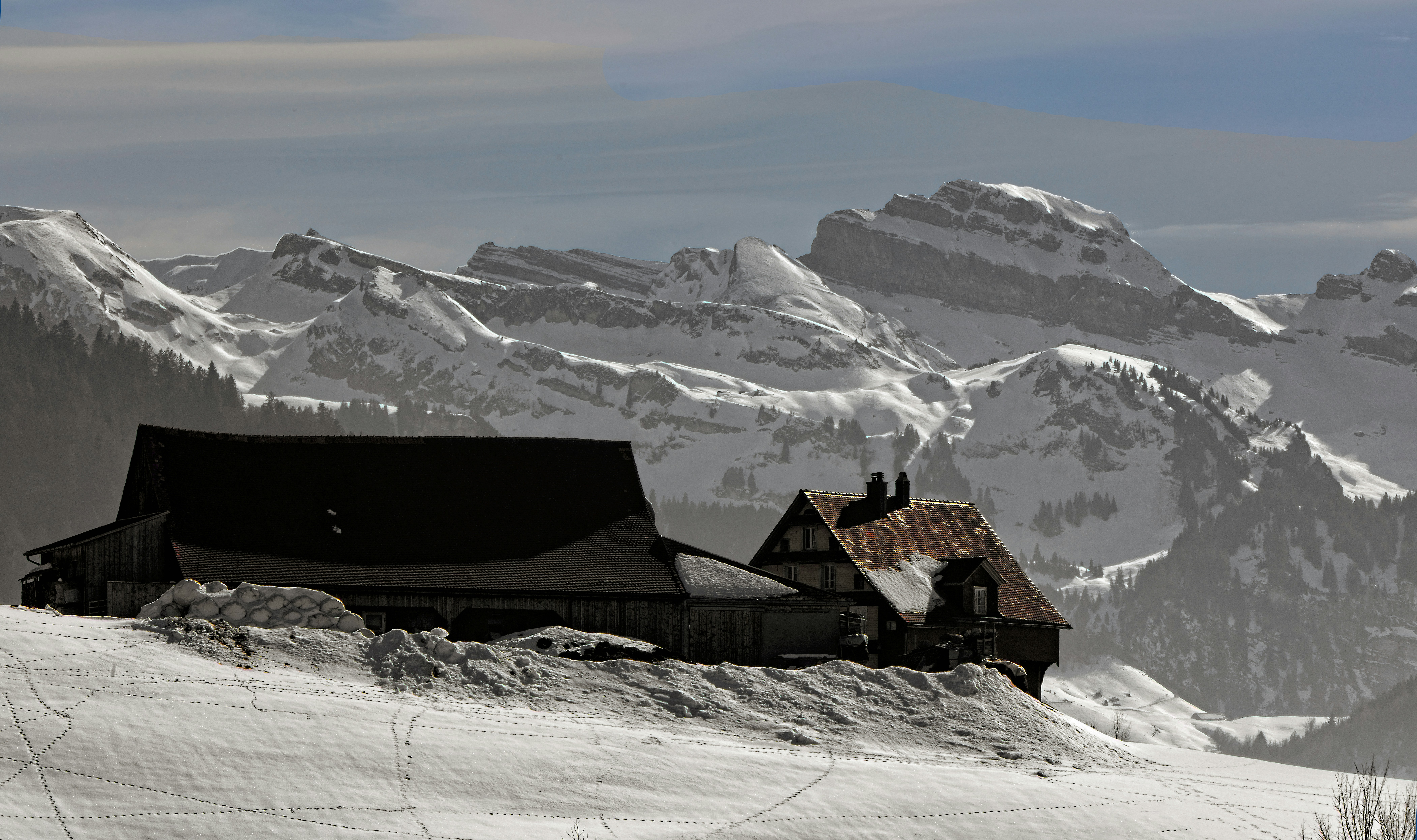 Alpine Refuge on a Snow-Carved Ridge
