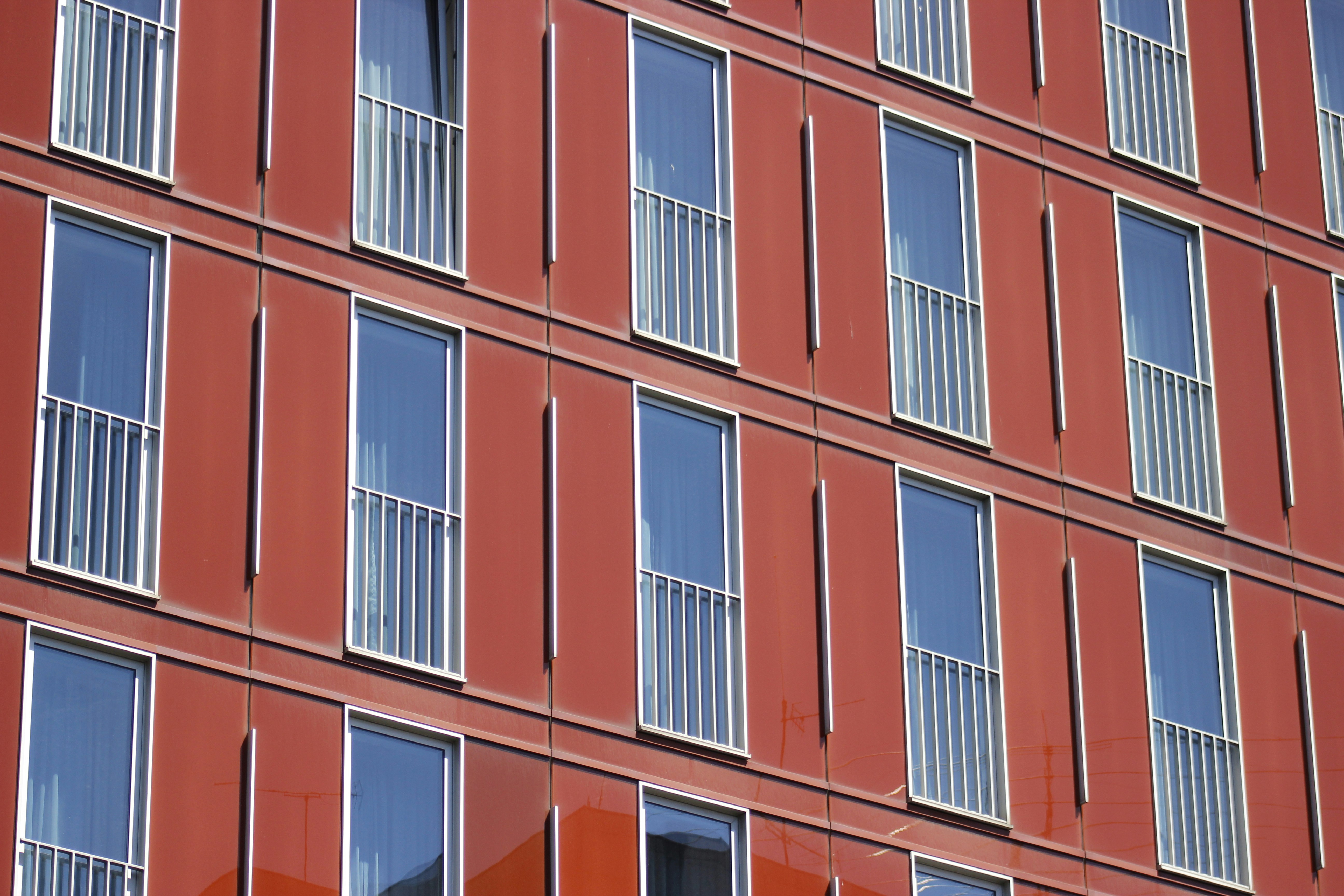 Red high-rise building photo – Free Pattern Image on Unsplash