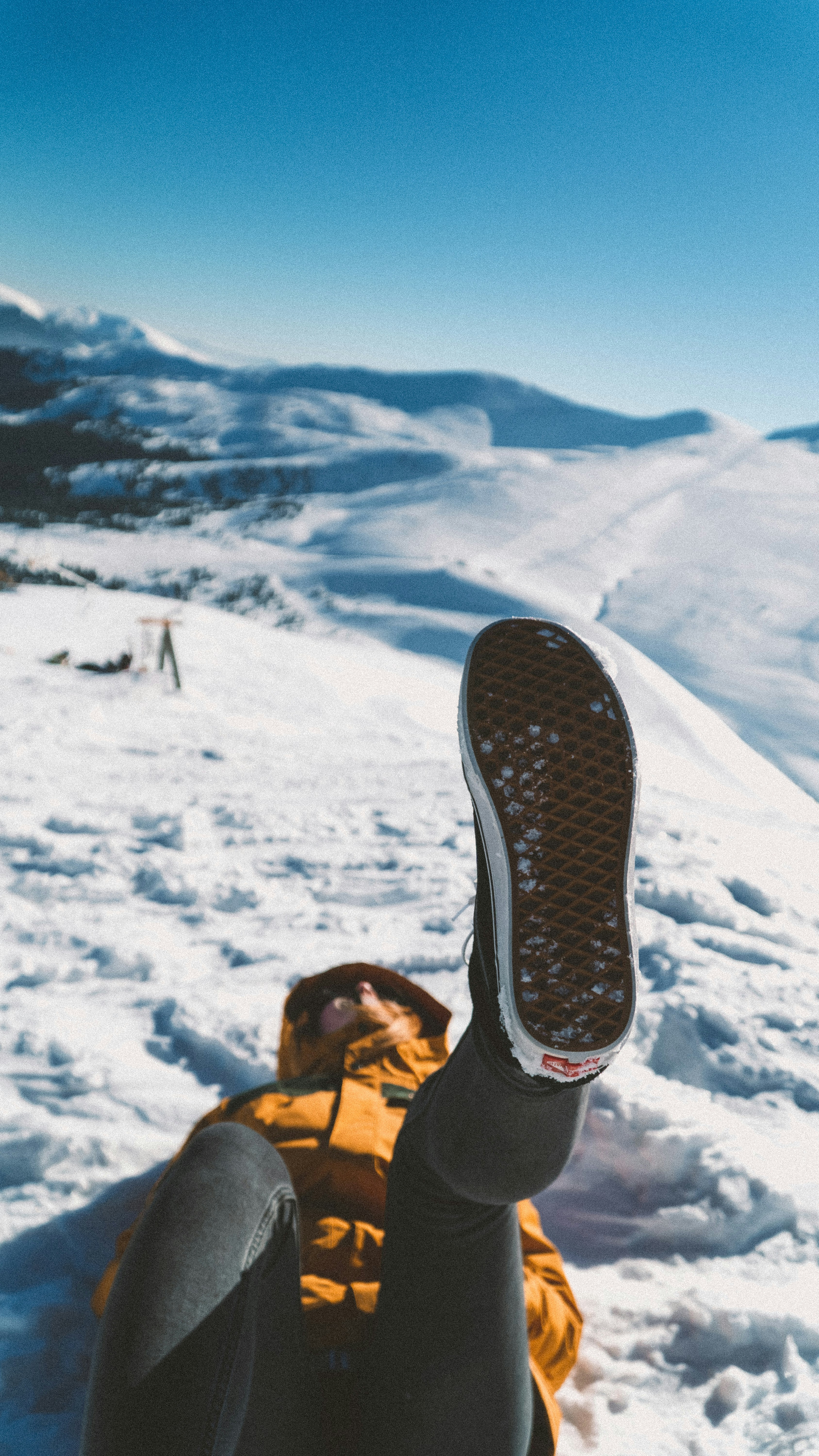 Sole in Snow: A Reclined Alpine Moment