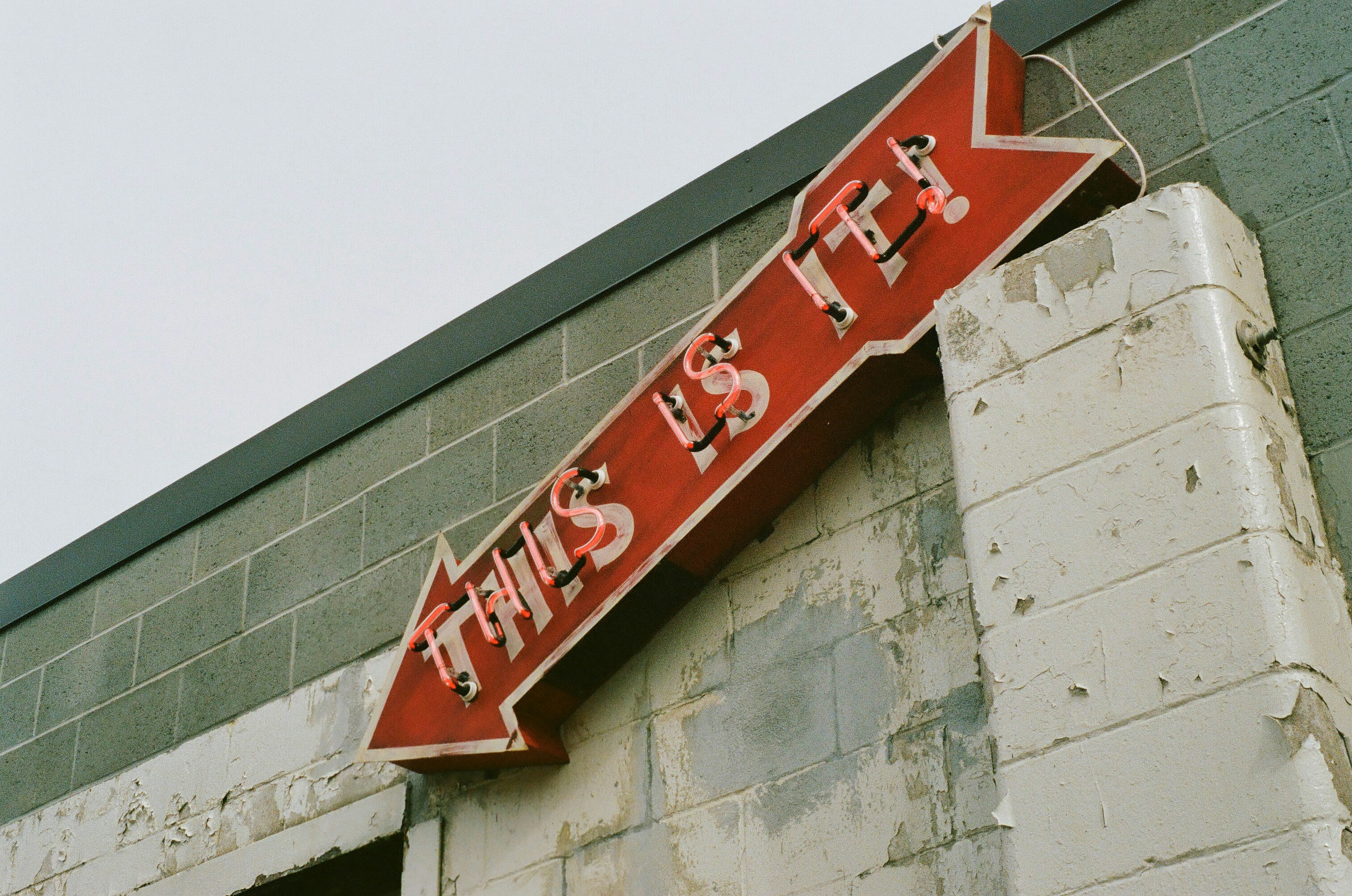 Red arrow signage photo – Free Brown Image on Unsplash