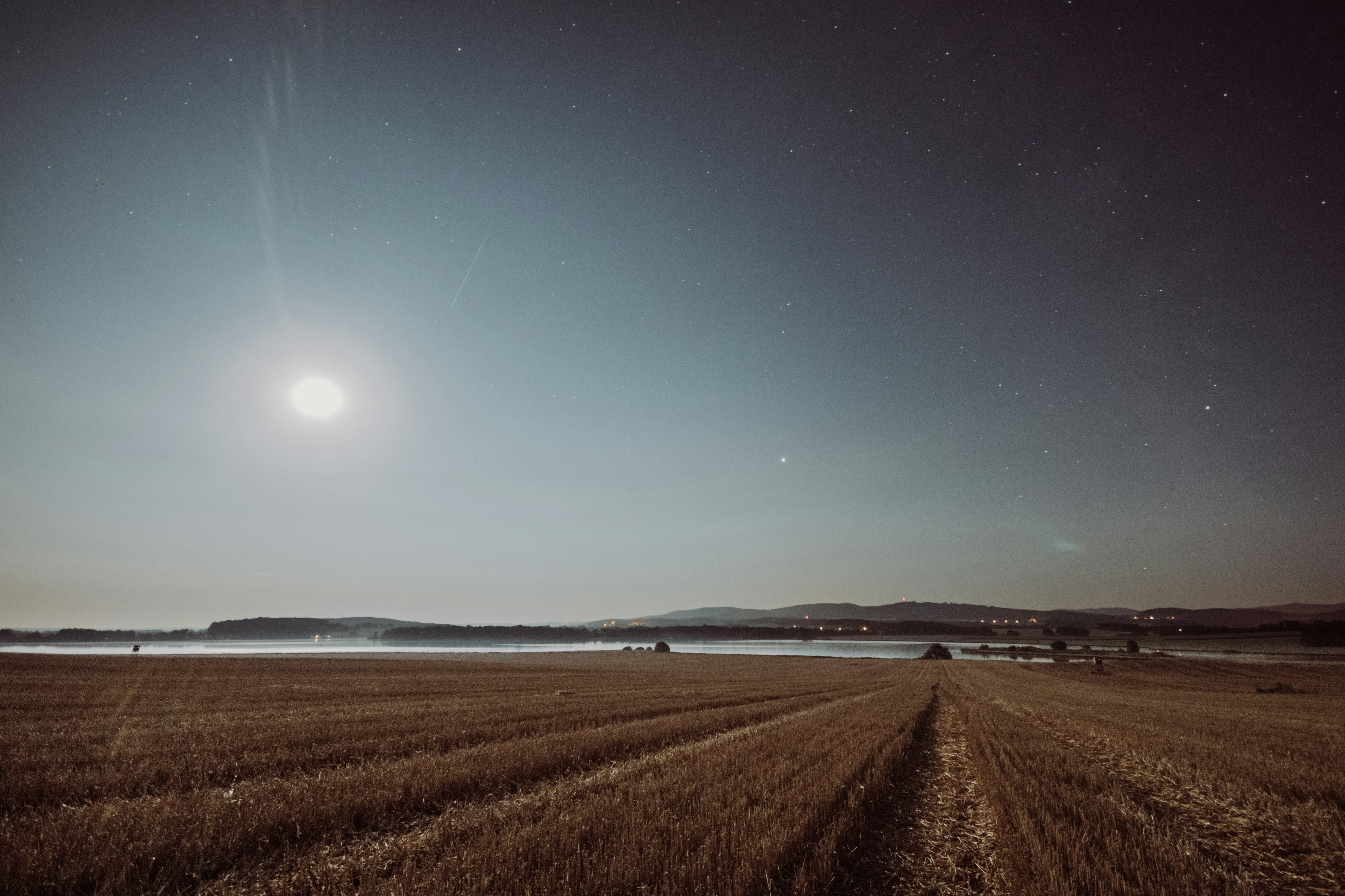 Moonlit Harvest: A Quiet Field Under a Starry Span