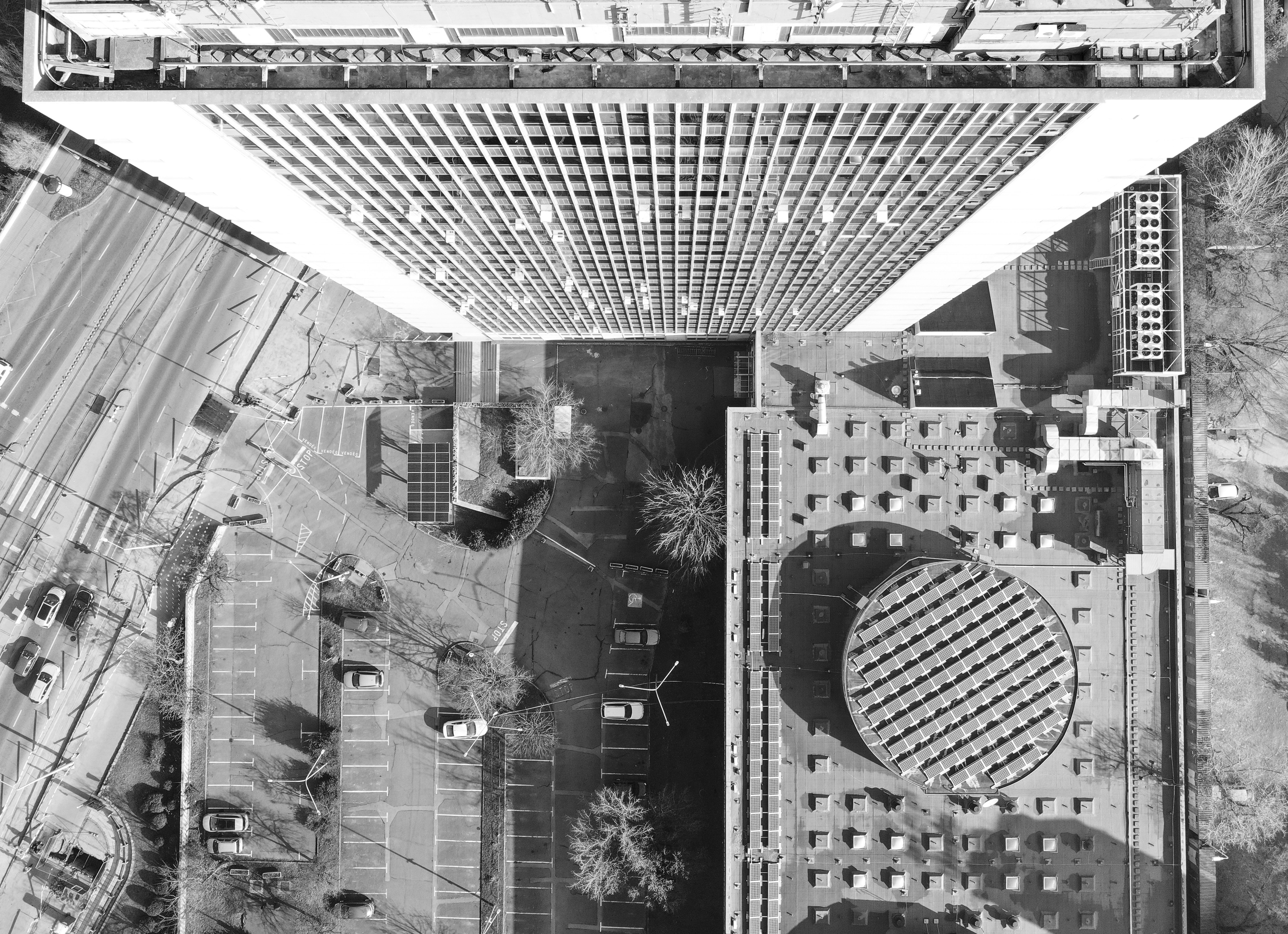 grayscale photography of high-rise building