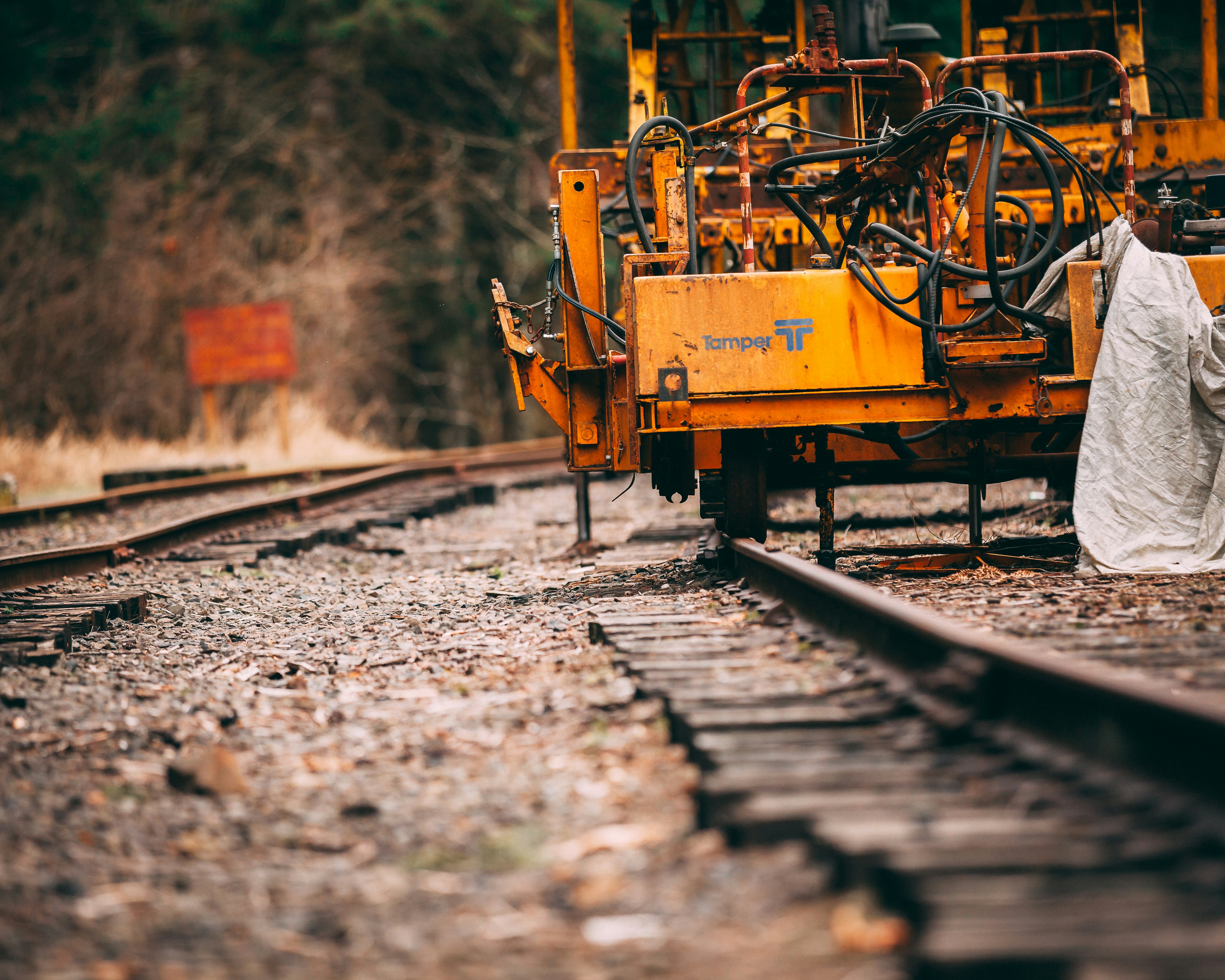 Orange railway vehicle photo – Free Background Image on Unsplash